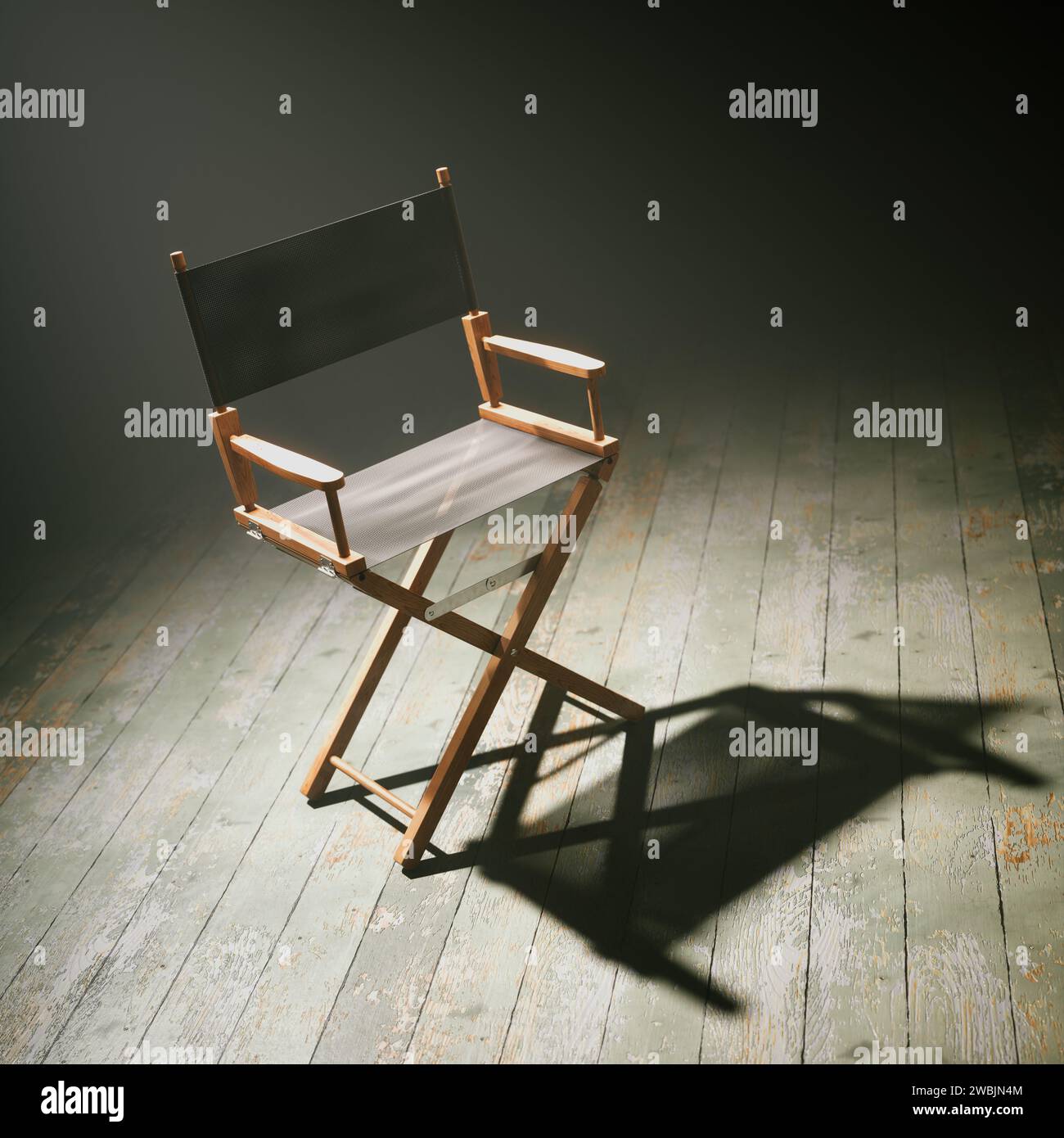 An isolated director's chair stands on a wooden stage, its shadow ...