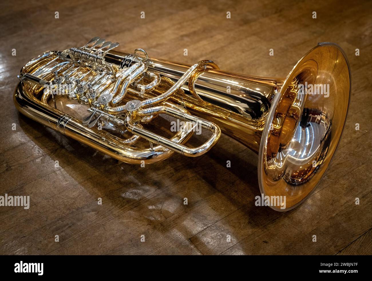 Berlin, Germany. 11th Jan, 2024. A bass tuba lies on the parquet floor ...
