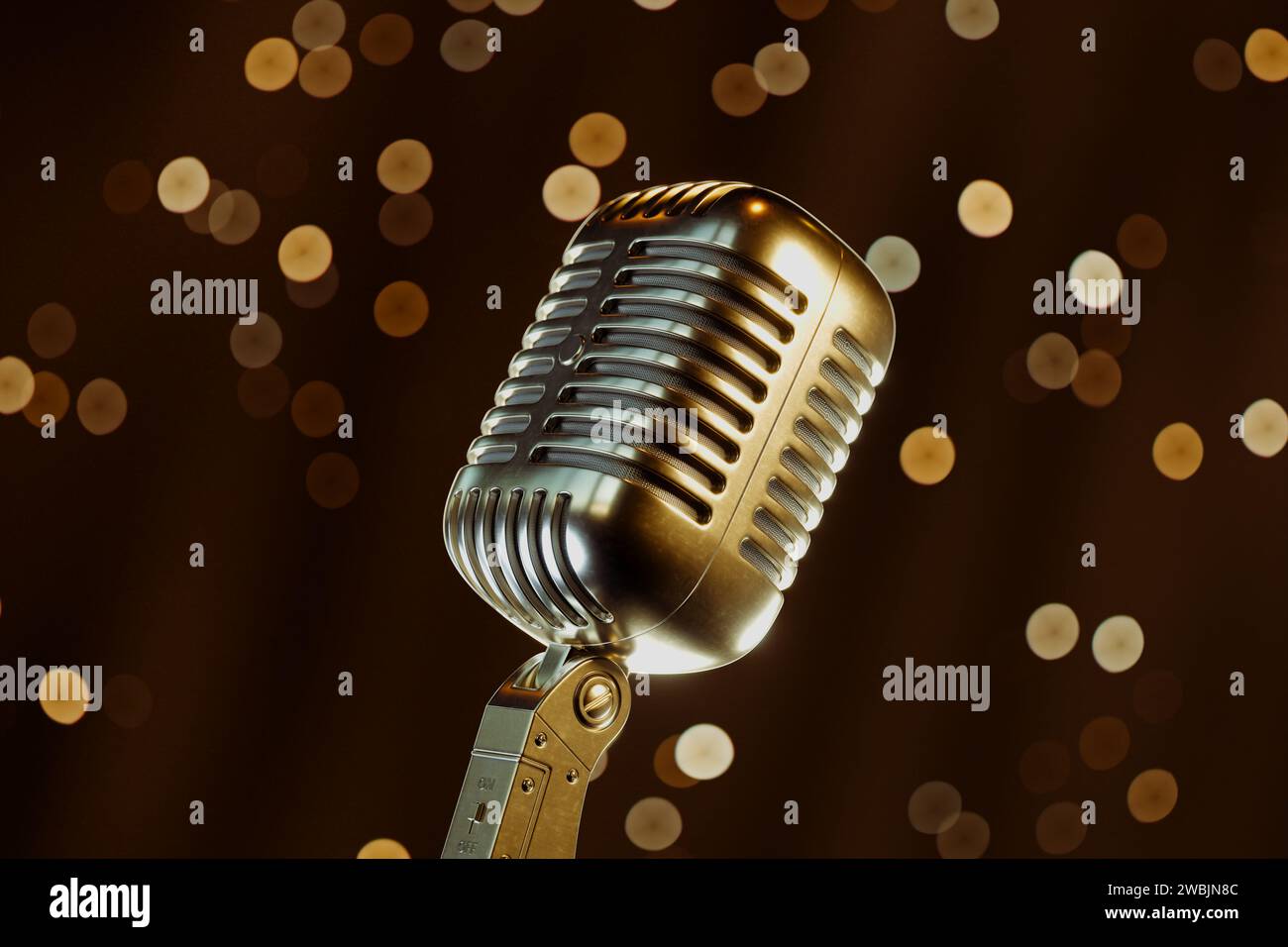 A retro-styled microphone stands out against a backdrop of warm bokeh ...