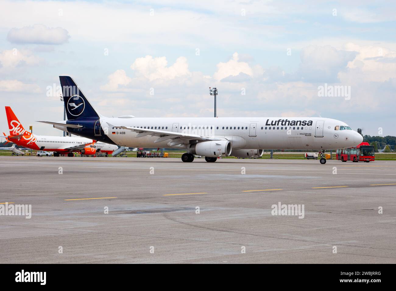 Passenger plane of the German airline Lufthansa D-AIDB. Airport apron ...