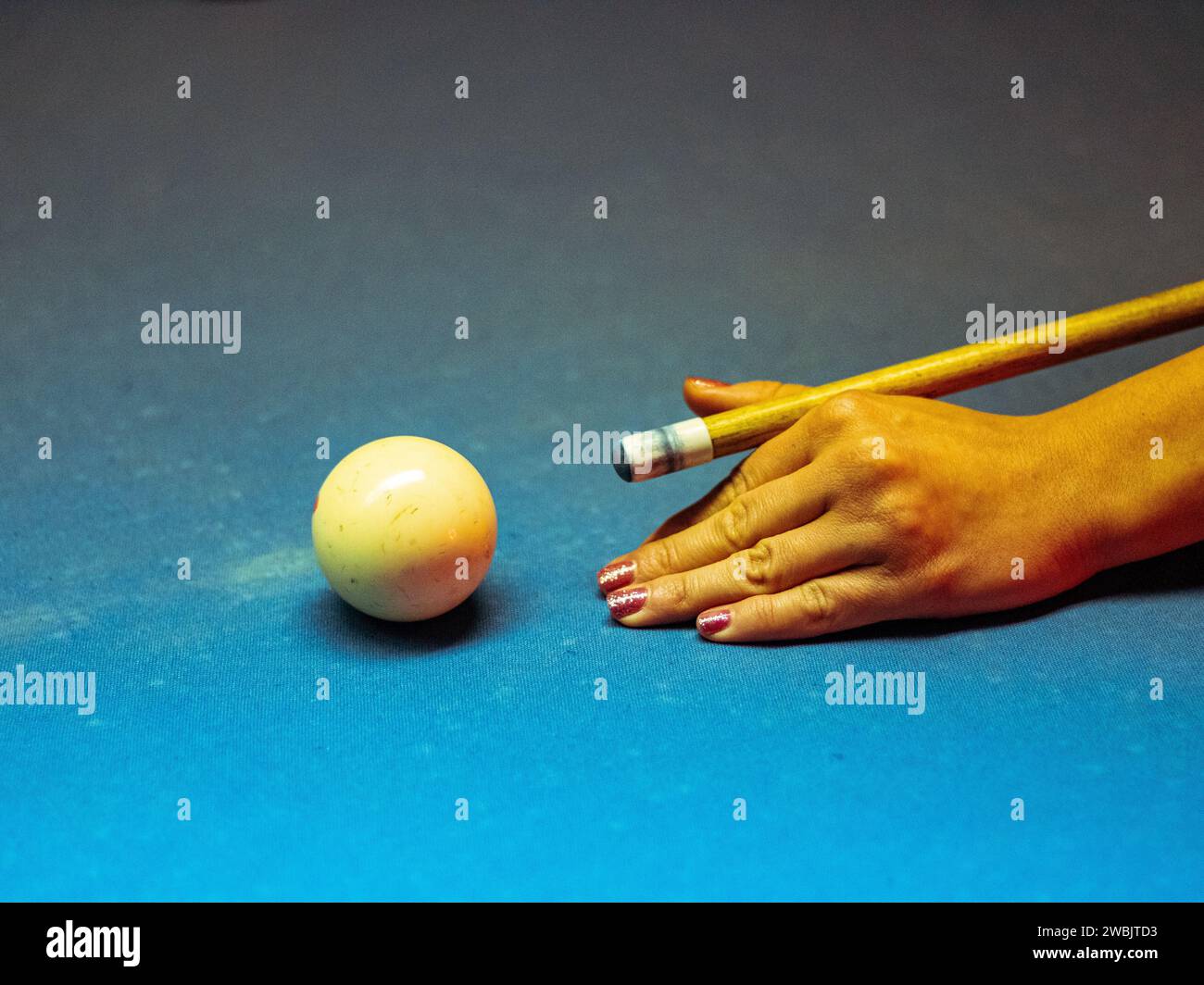 Closeup of colorful billiard balls on blue pool table in daylight Stock ...