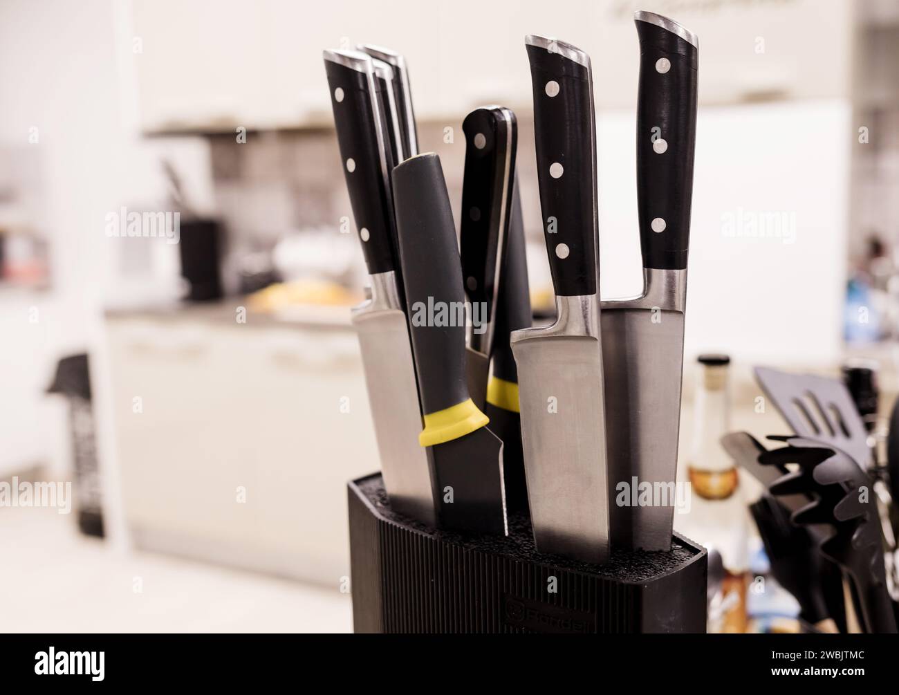 Set of Kitchen knives in a knife block with the chef knife Stock Photo ...