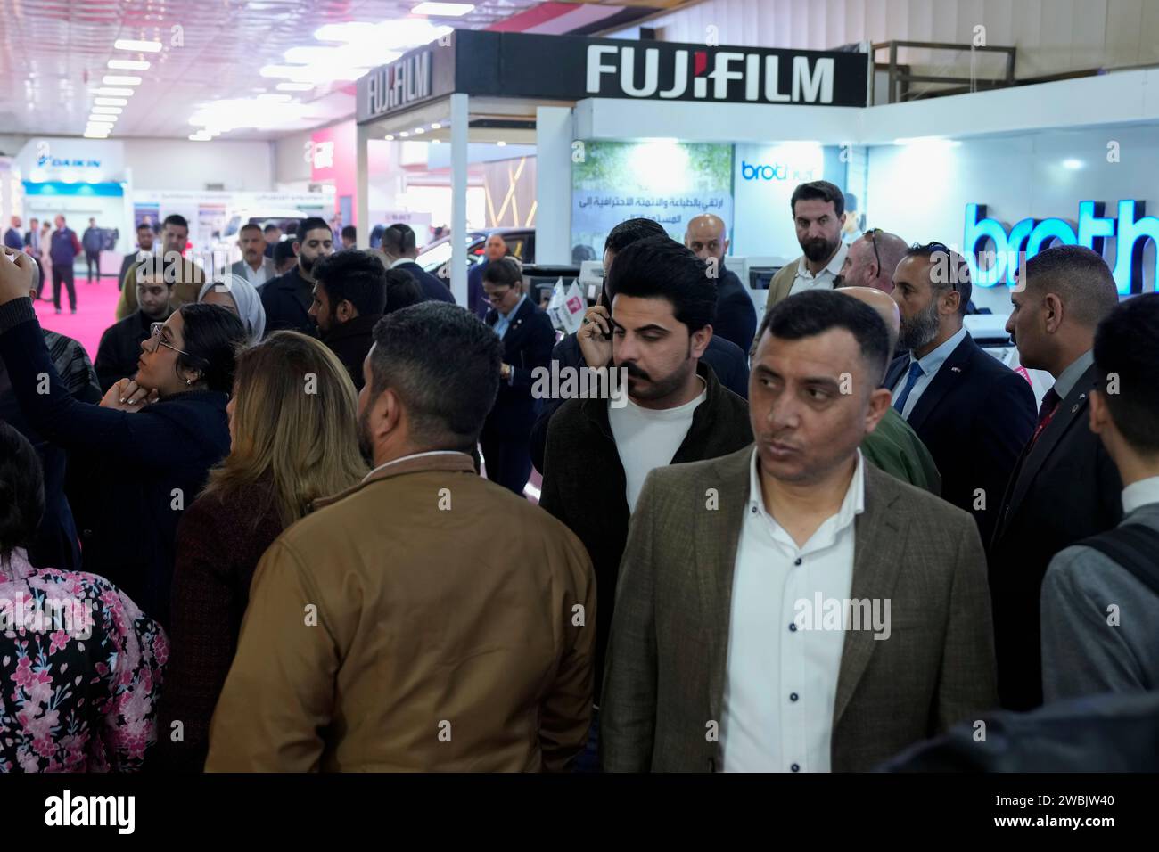 Visitors tour the Baghdad International fair in Baghdad, Iraq, Thursday ...