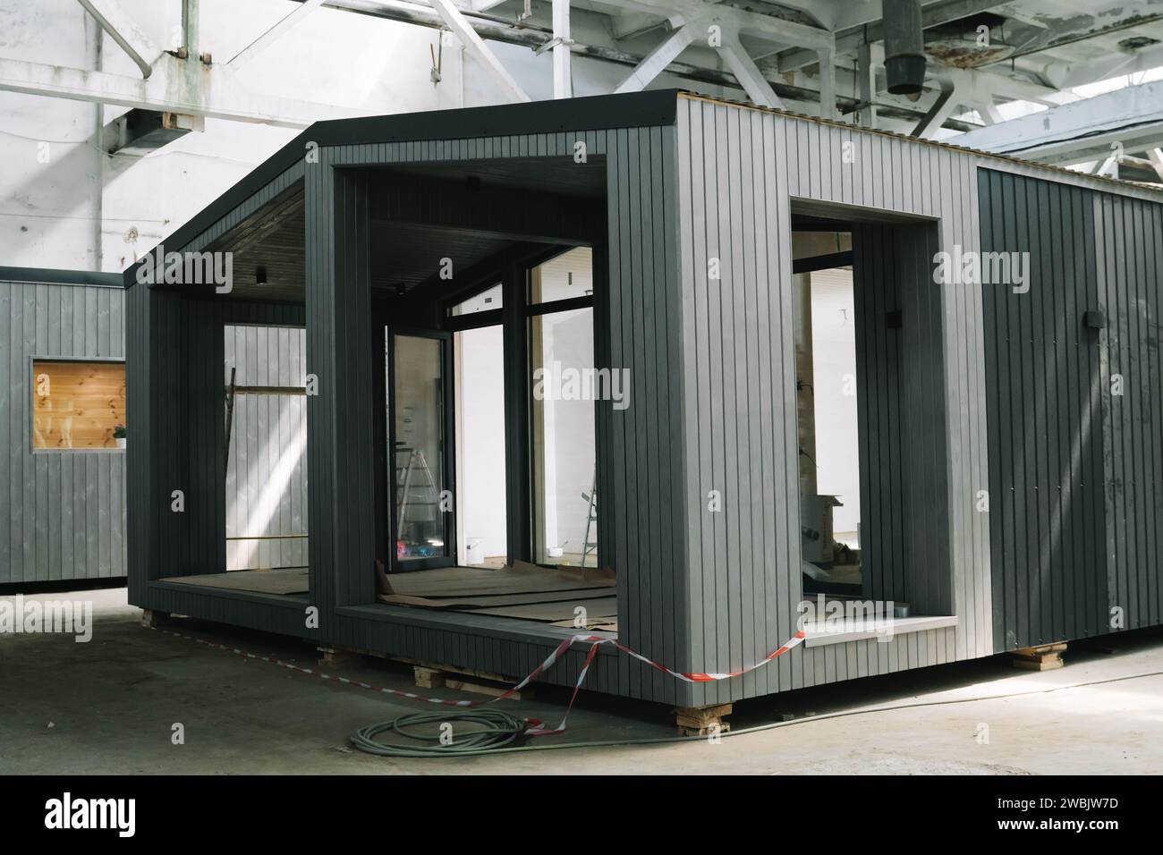 A new wooden modular prefabricated house inside in manufacturing ...