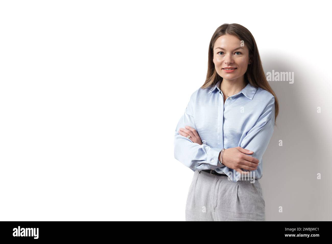 Self-Assured Businesswoman in Light Attire Stock Photo - Alamy