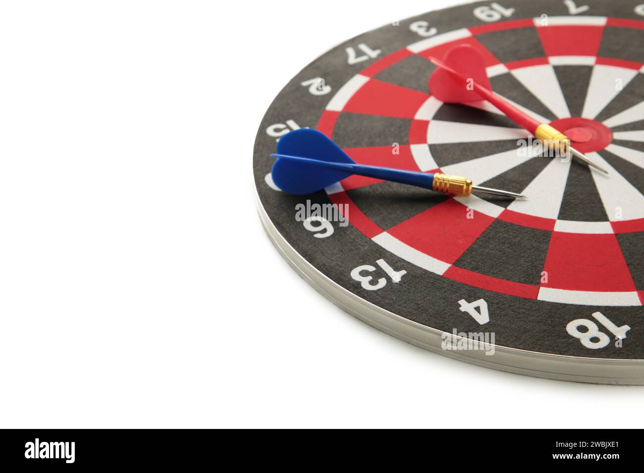 Dart board with blue dart isolated on white background. Top view Stock ...
