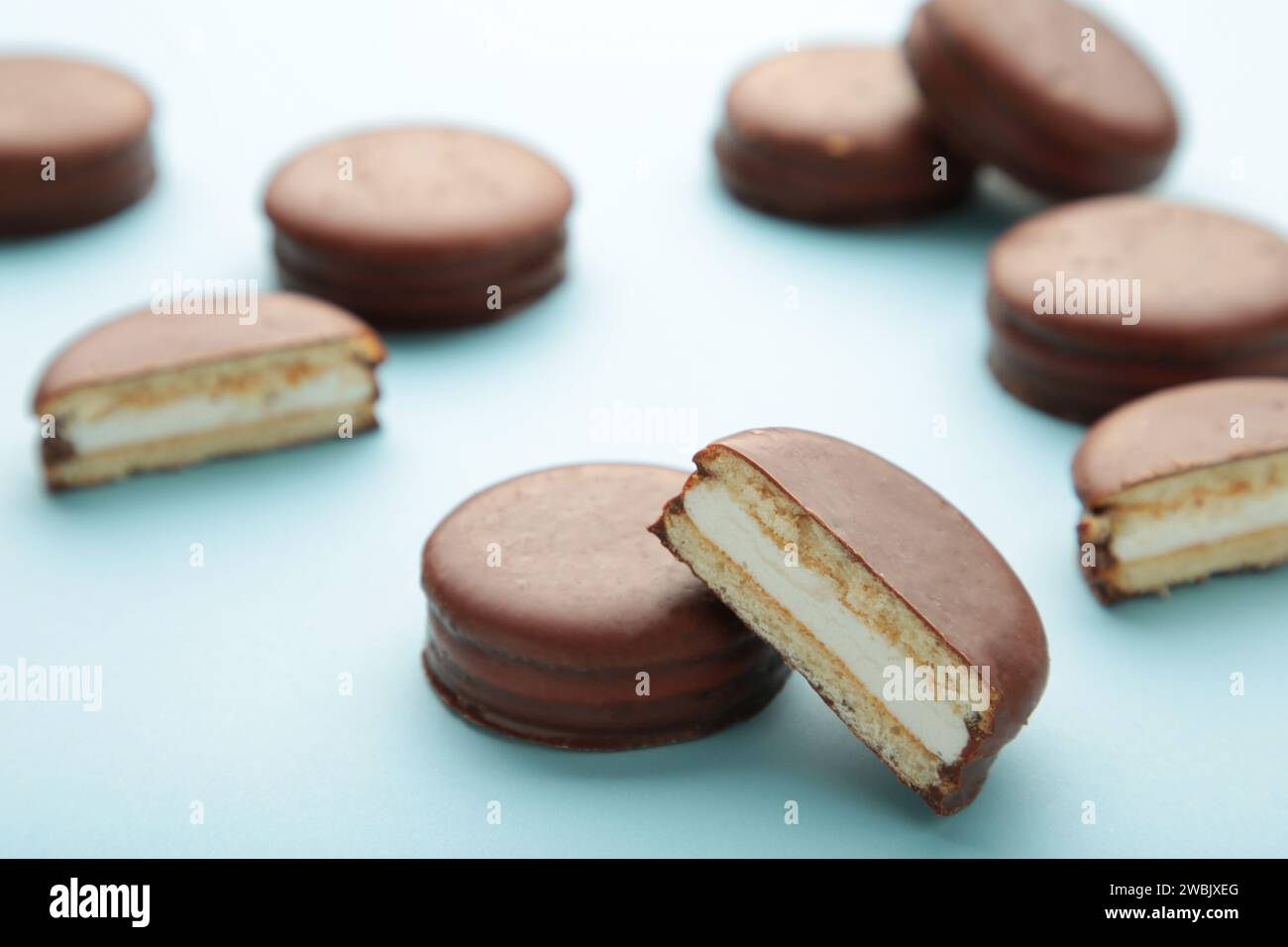 Choco pie chocolate coated snacks on blue background. Top view Stock ...