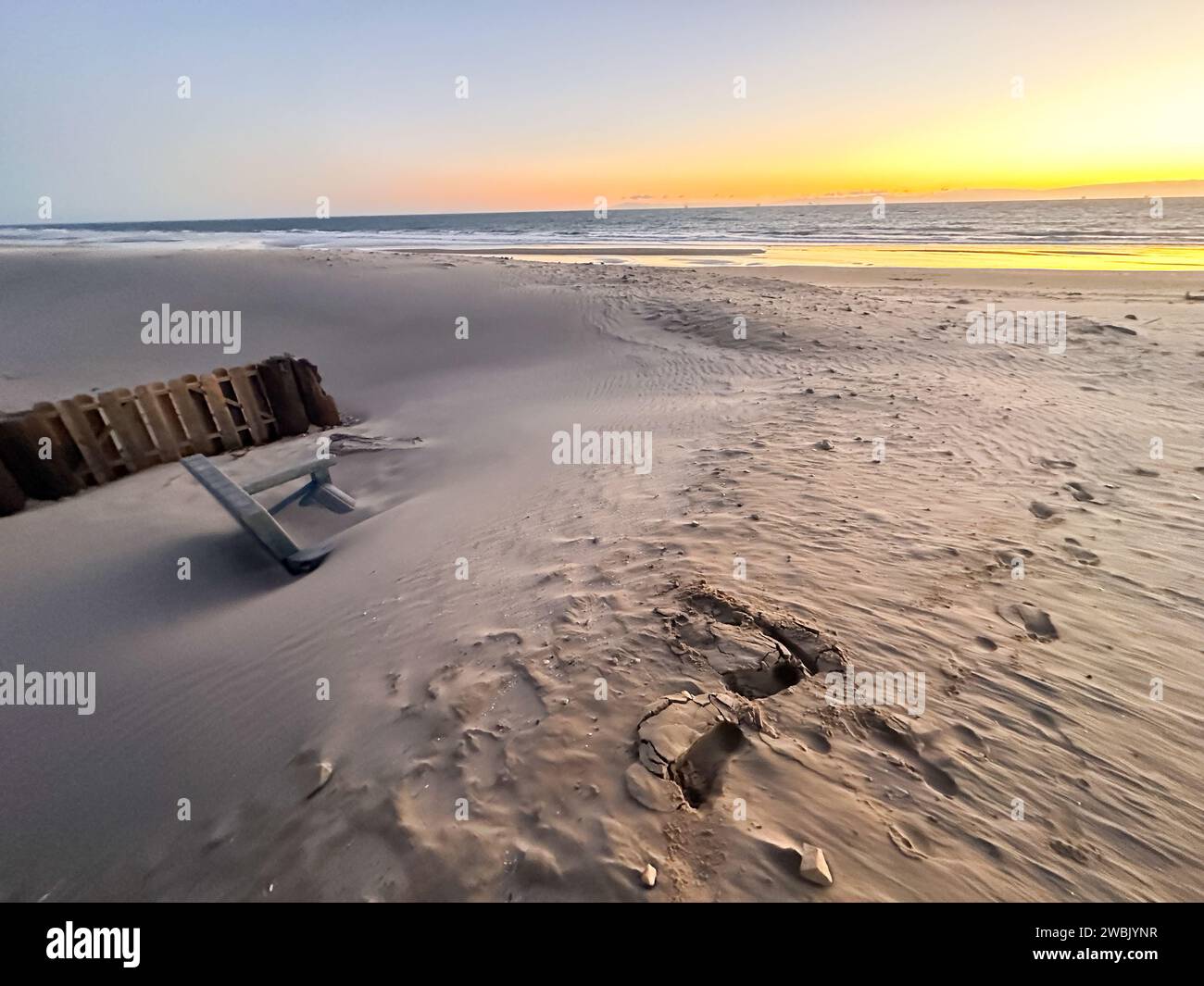 Carpinteria, California, U.S.A. 10th Jan, 2024. Partially buried bench ...