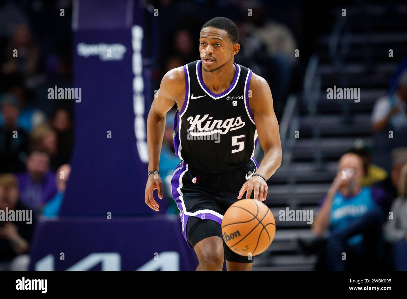 Sacramento Kings guard De'Aaron Fox brings the ball up court against ...
