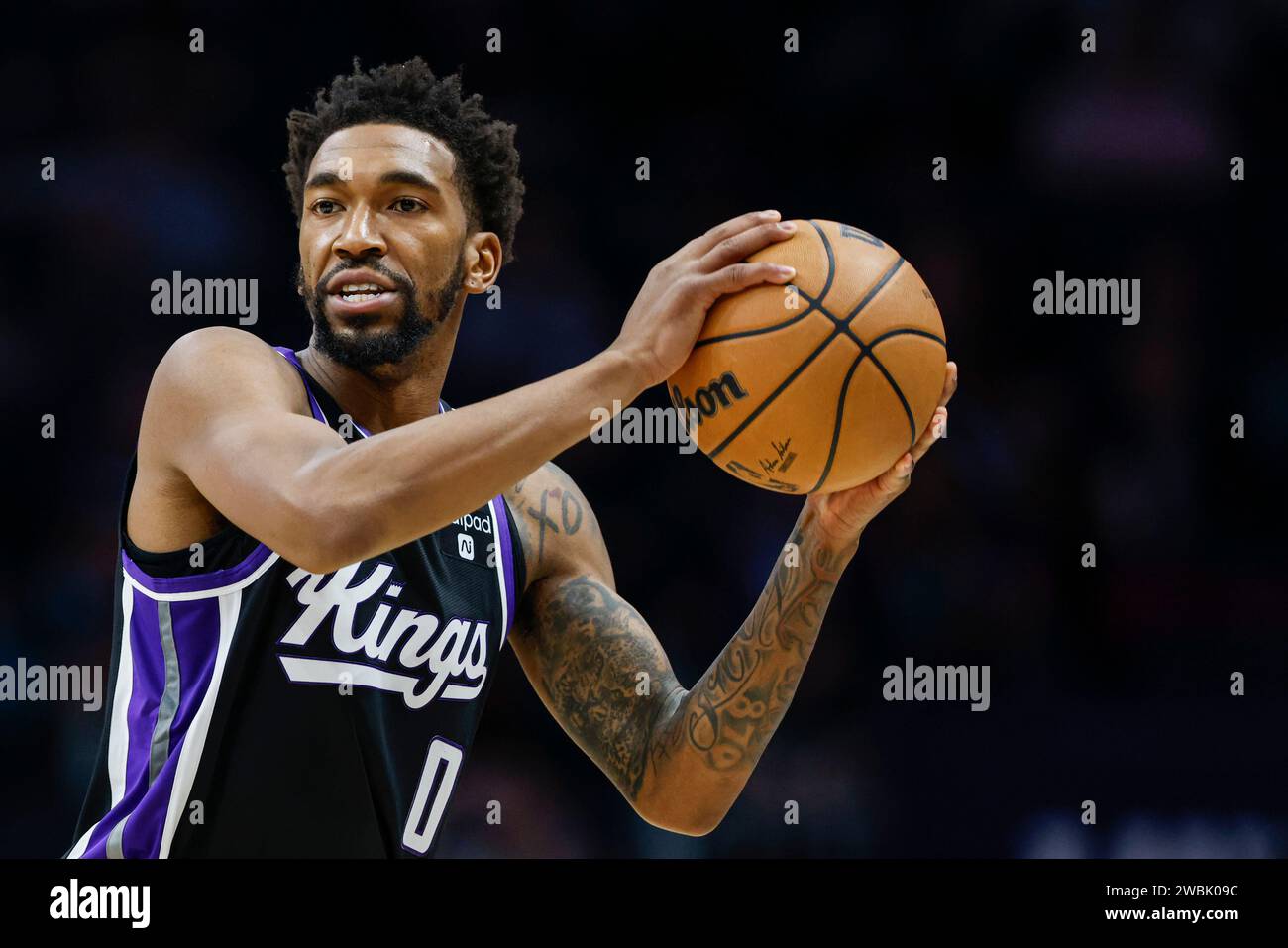 Sacramento Kings guard Malik Monk looks to pass against the Charlotte ...
