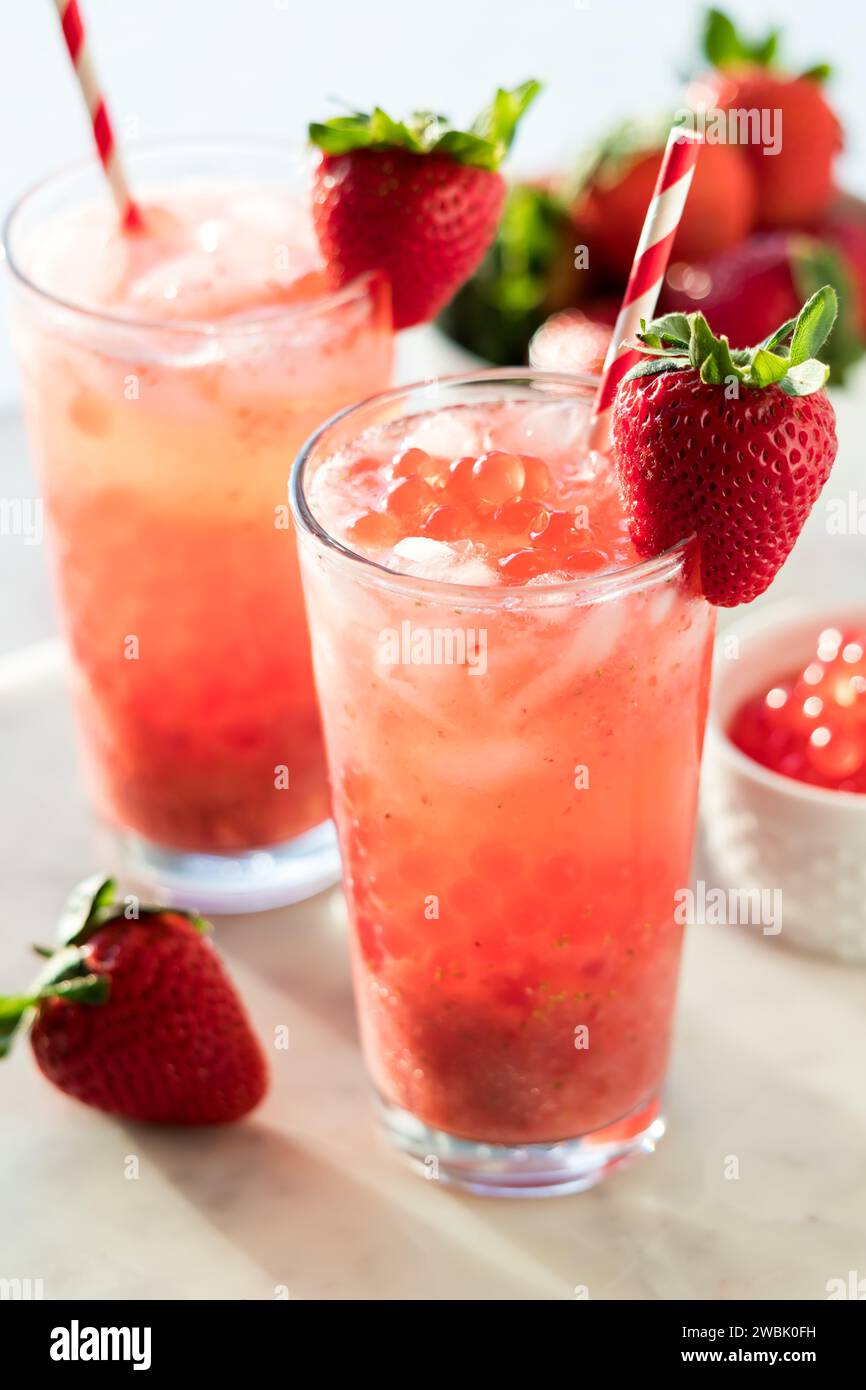 Glasses of refreshing strawberry lemonade with bubble popping pearls ...