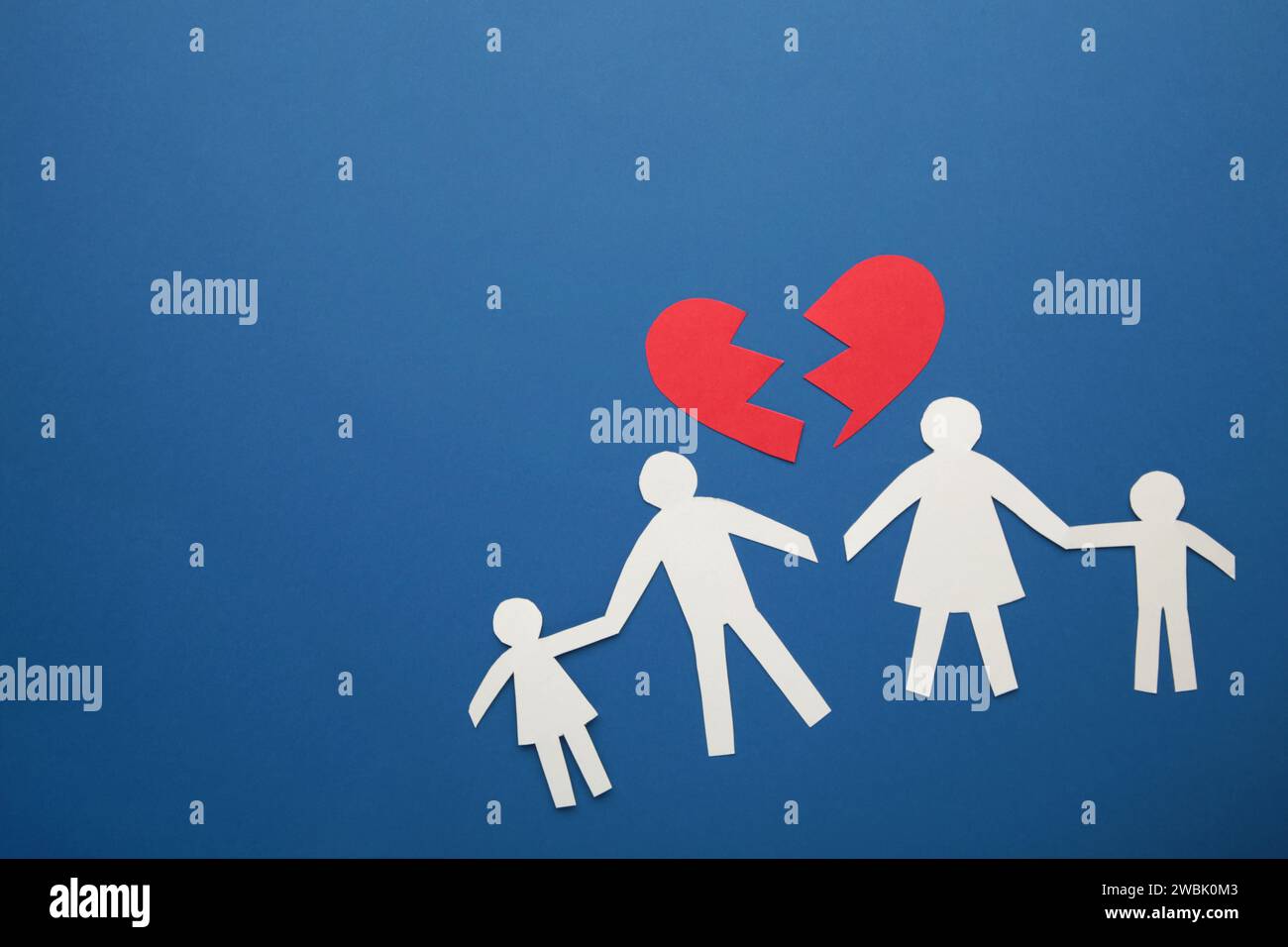 Broken family concept on blue background with copy. Divorce concept ...