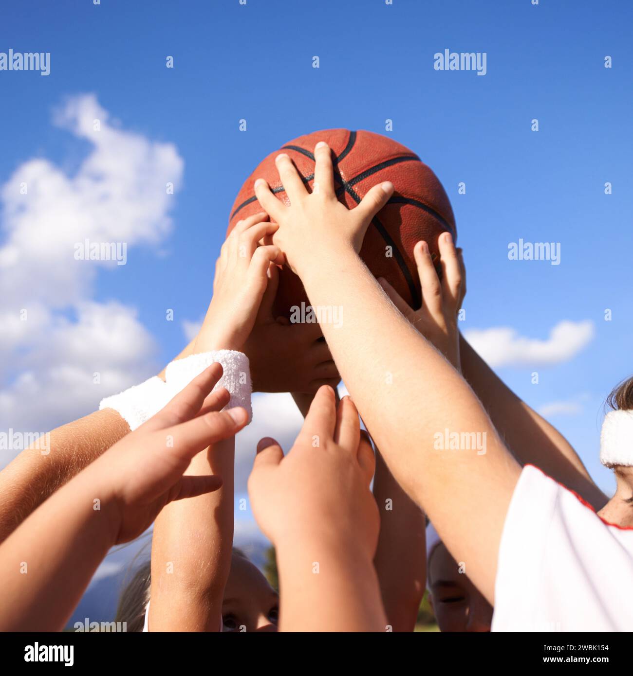 People, hands and basketball in team sports for motivation, unity or ...