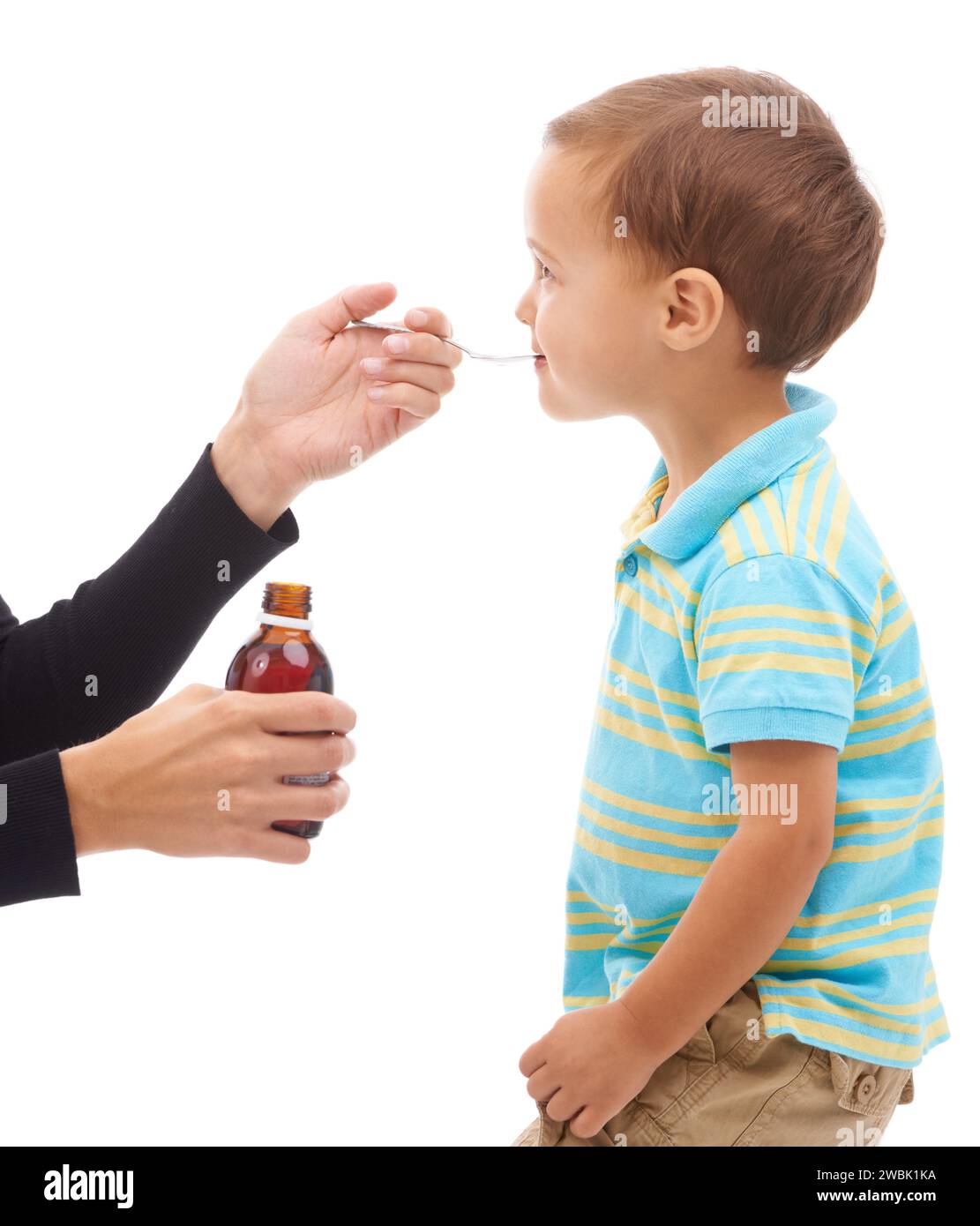 Hands, medicine and spoon for child in studio, care and thinking with ...