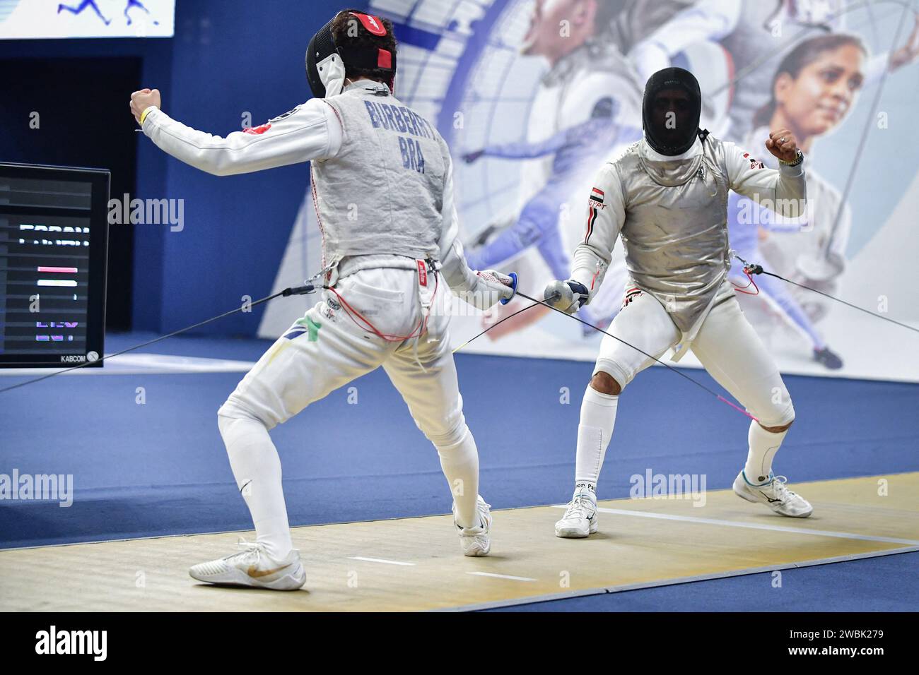 Paris, France. 11th Jan, 2024. Egypt's foilist MOHAMED ESSAM (R ...