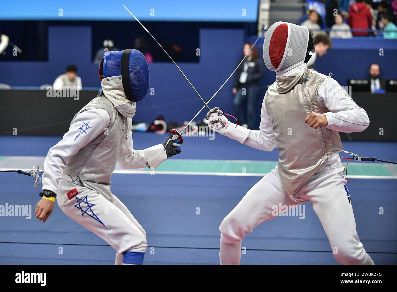 Paris, France. 11th Jan, 2024. France's foilist ANAS ANANE (R) competes ...