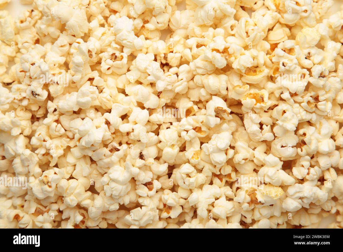 Scattered salted popcorn, texture background Stock Photo - Alamy