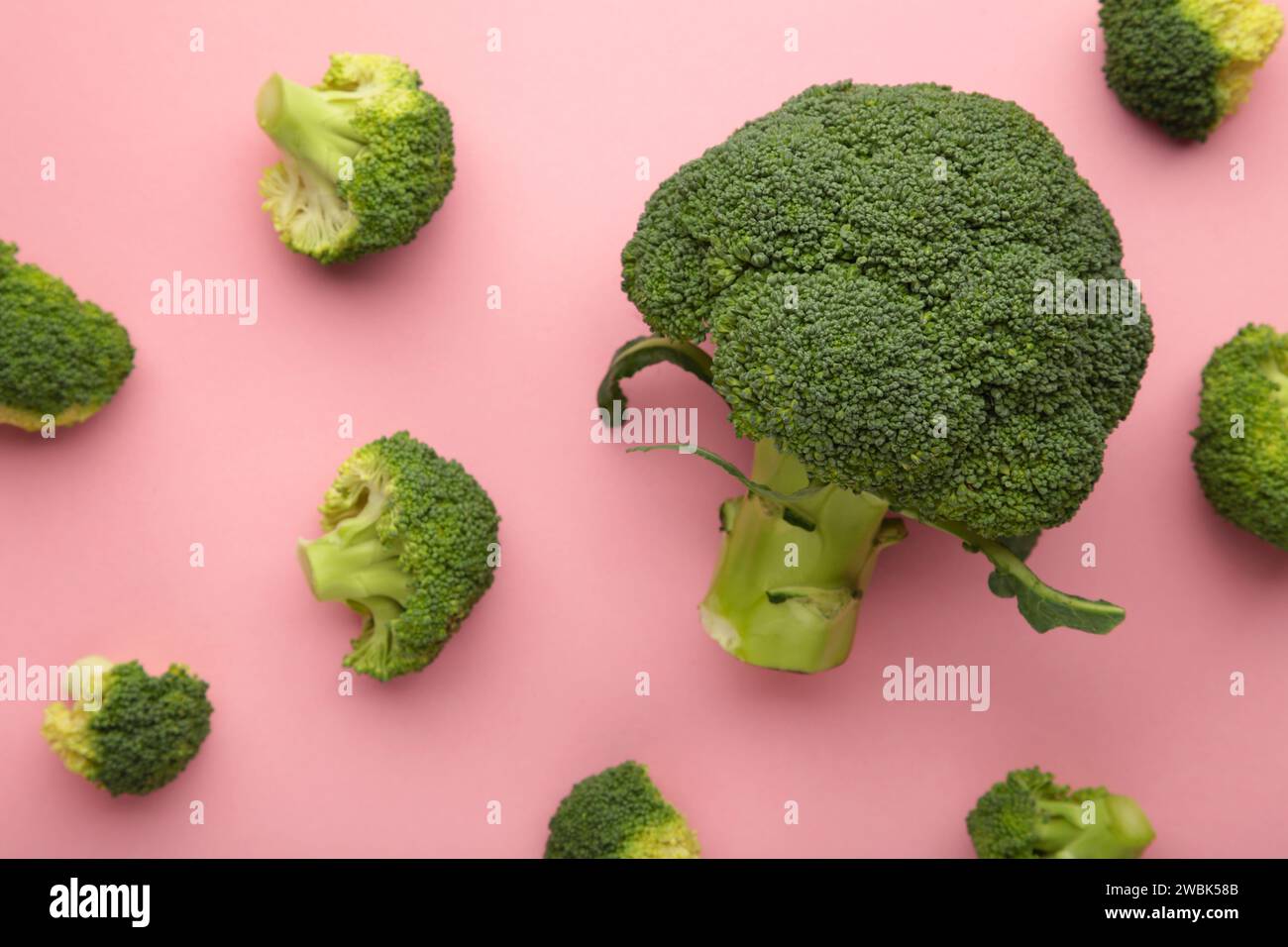 Broccoli cabbage on a pink background. Pattern of fresh broccoli ...