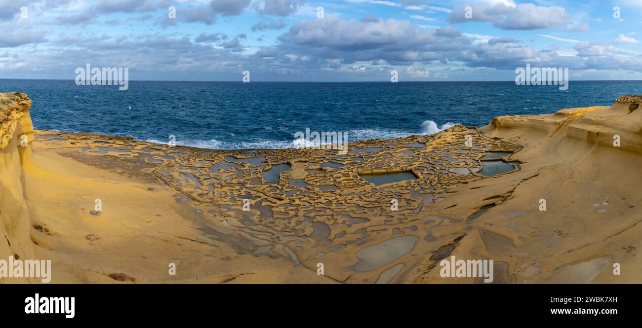 A panorama view of the salt pans in Xwejni Bay on the Maltese island of ...