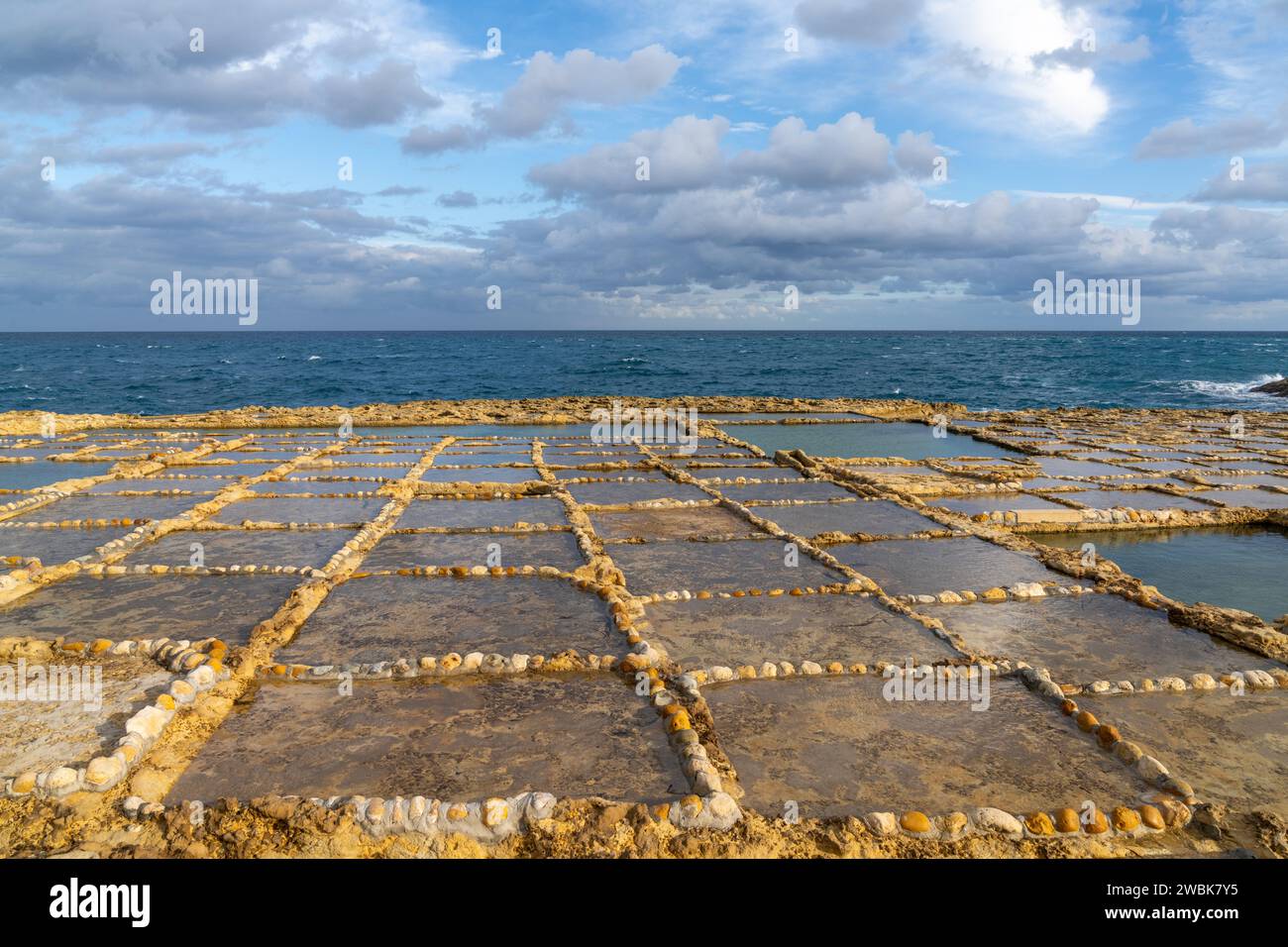 A view of the salt pans in Xwejni Bay on the Maltese island of Gozo ...