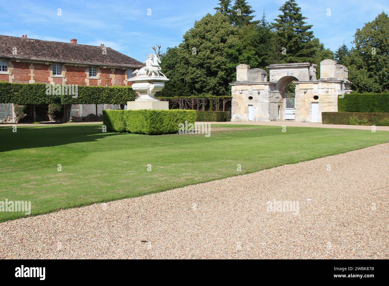commons, gate and statue in the gardens of a renaissance castle (anet ...
