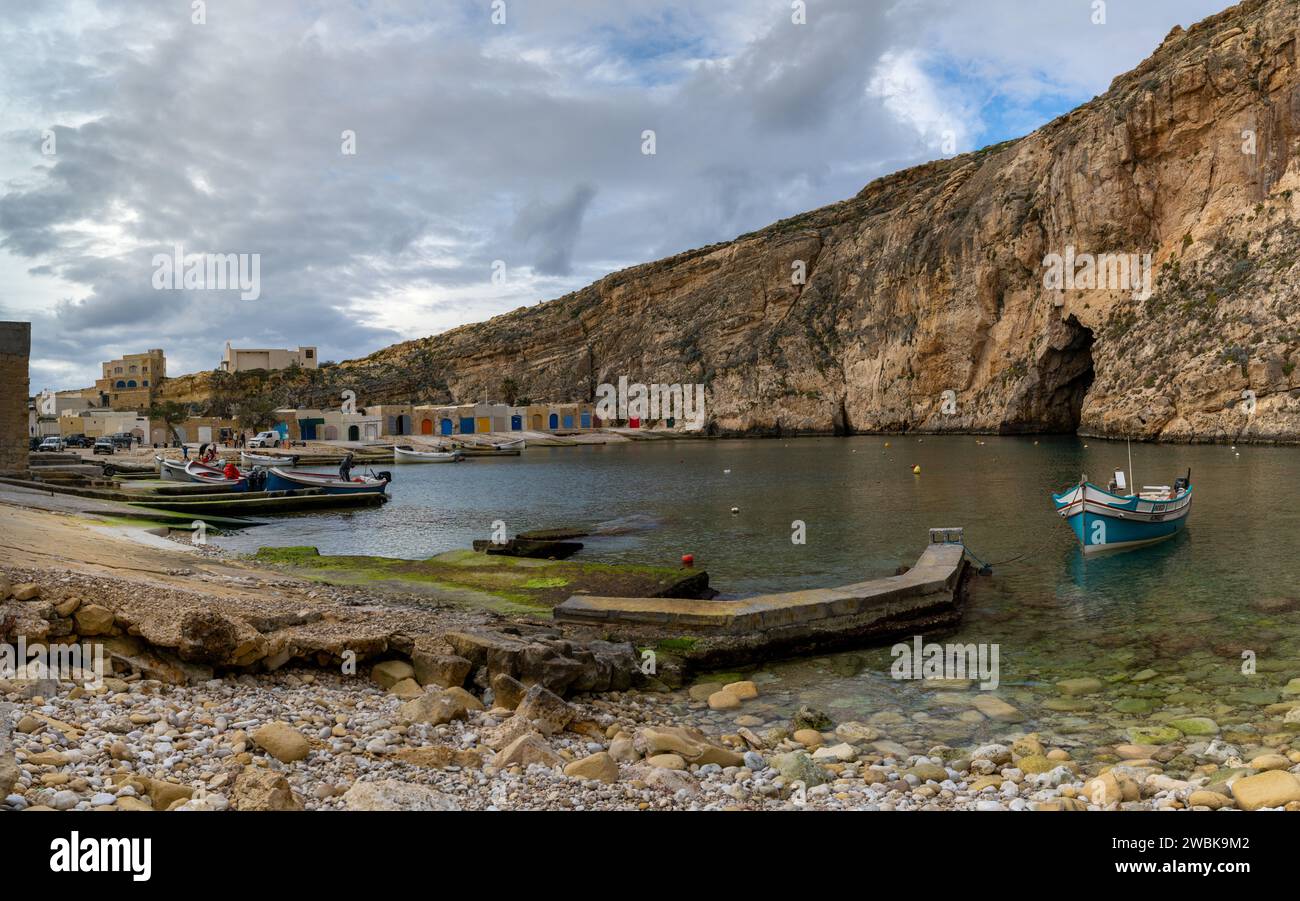 Dwejra, Malta - 19 December, 2023: colourful fishing village and boats ...