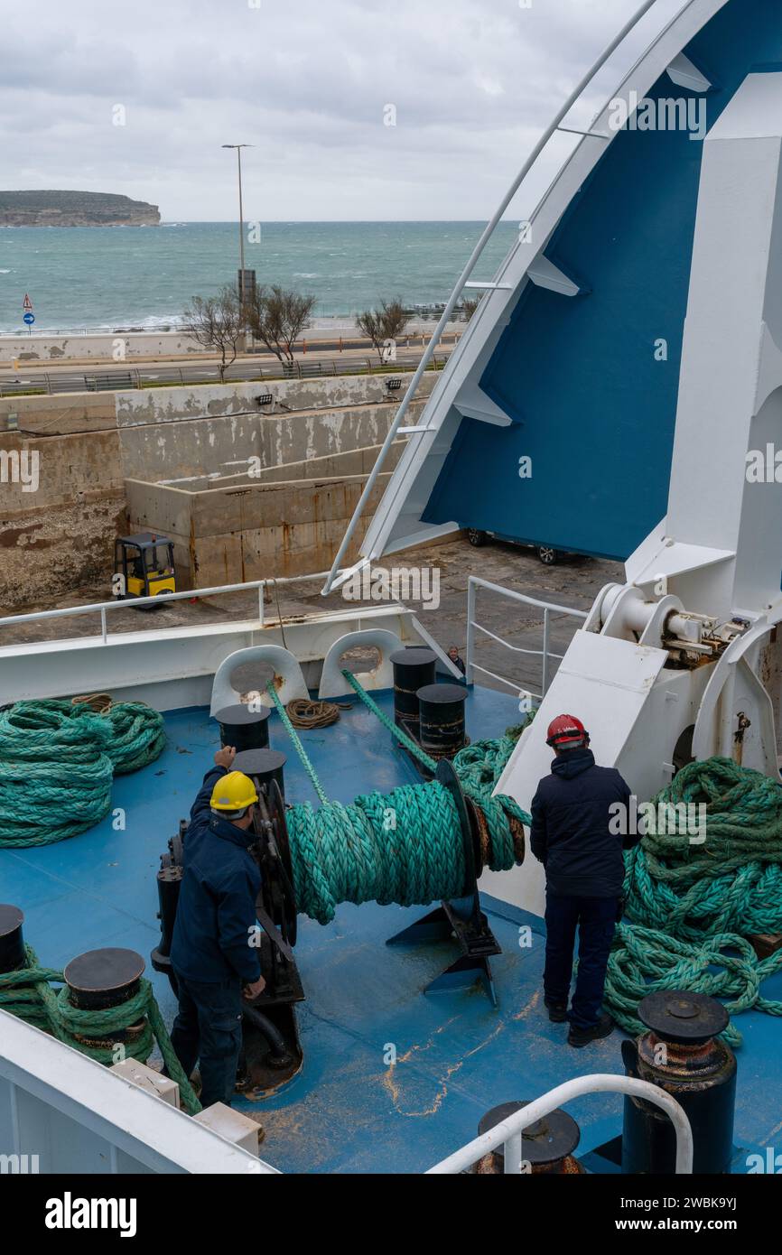 Mgarr, Malta - 18 December, 2023: deck hands remove the bow lines and ...