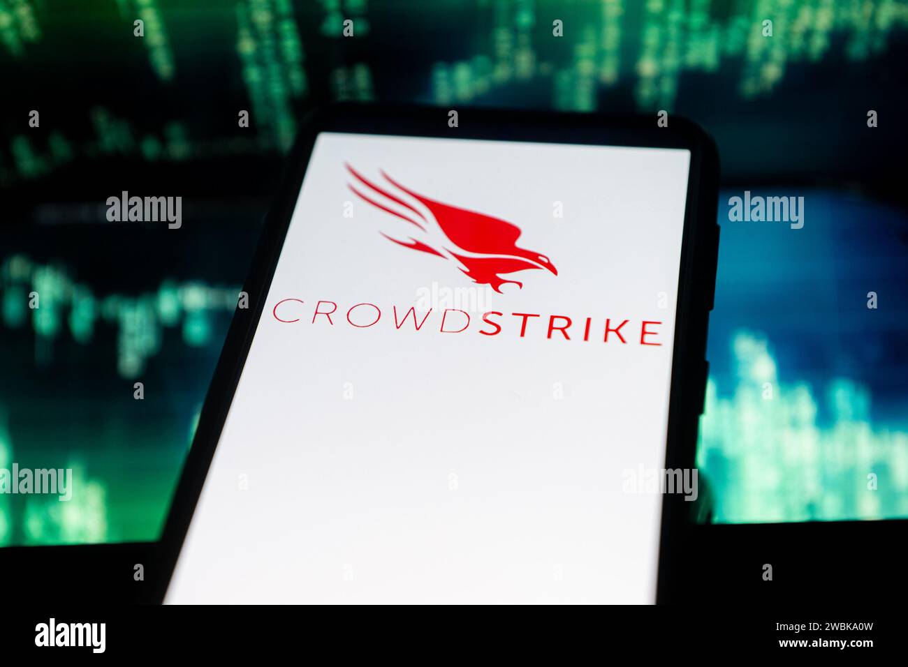 In this photo illustration a Crowdstrike logo seen displayed on a ...