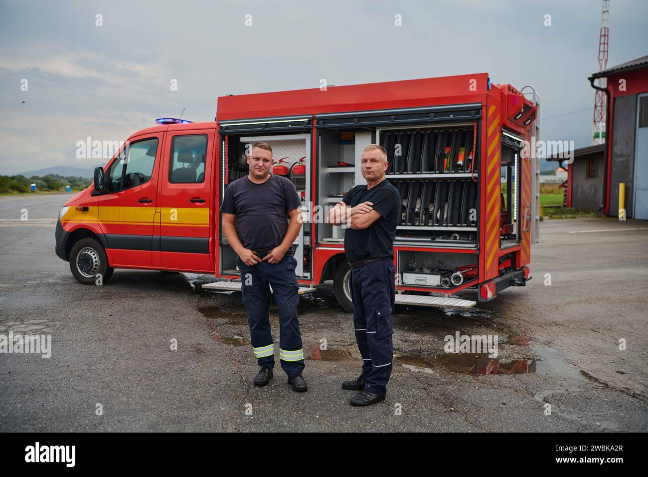 A skilled and dedicated professional firefighting team proudly poses in ...