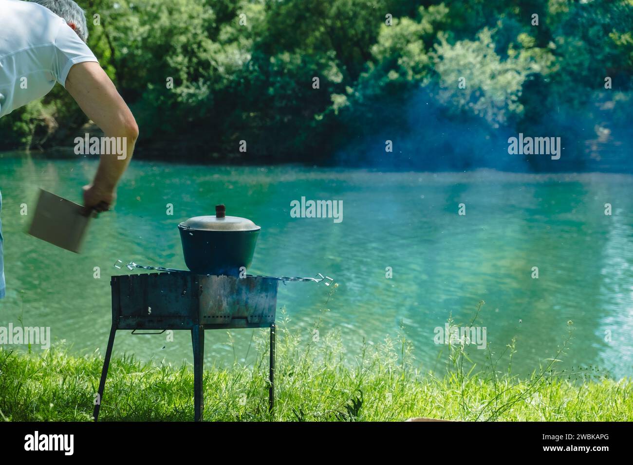 Cooking food on fire bank hi-res stock photography and images - Alamy