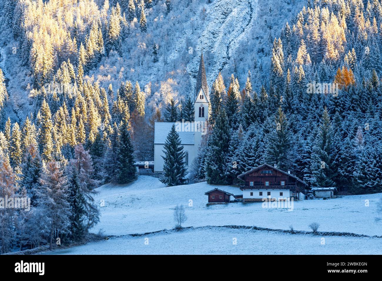 First snowfall of the santa maddalena church hi-res stock photography ...