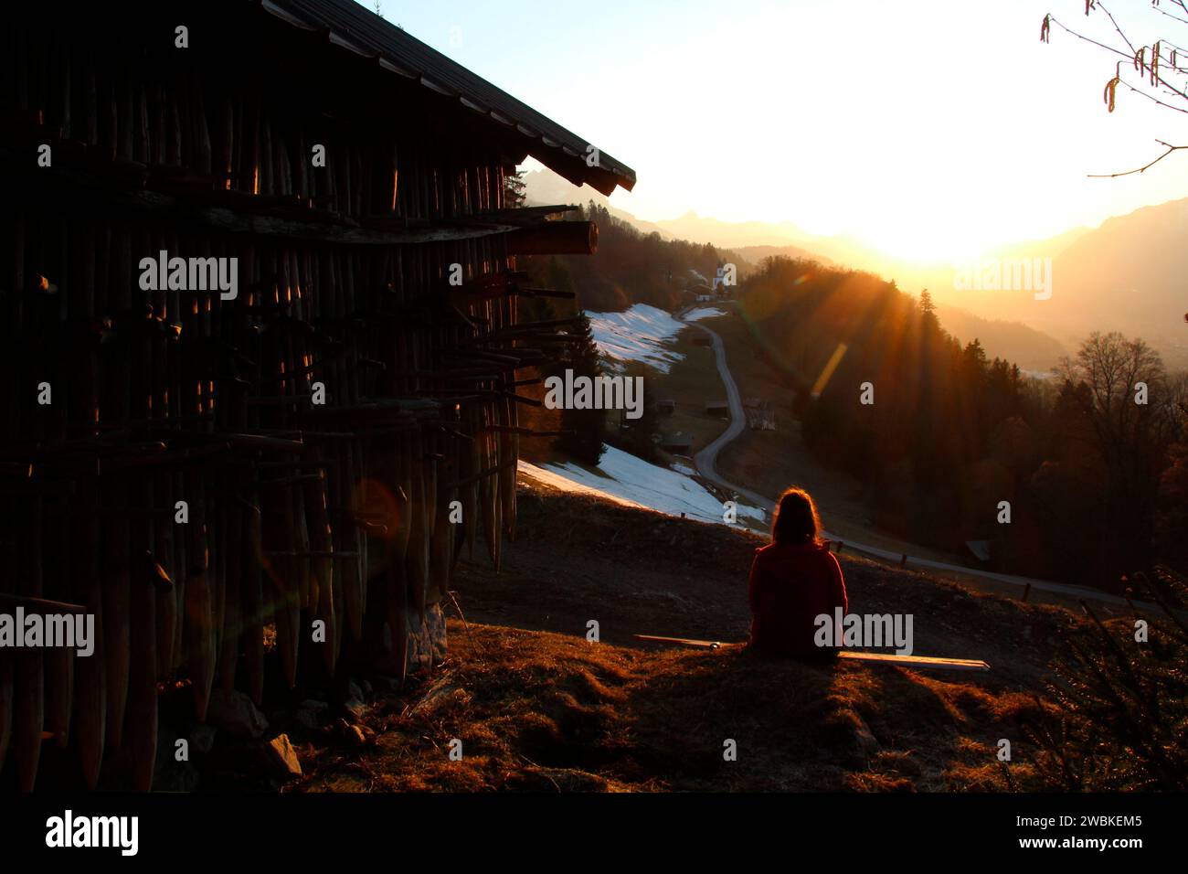 Young woman in sunset with view to wamberg hi-res stock photography and ...