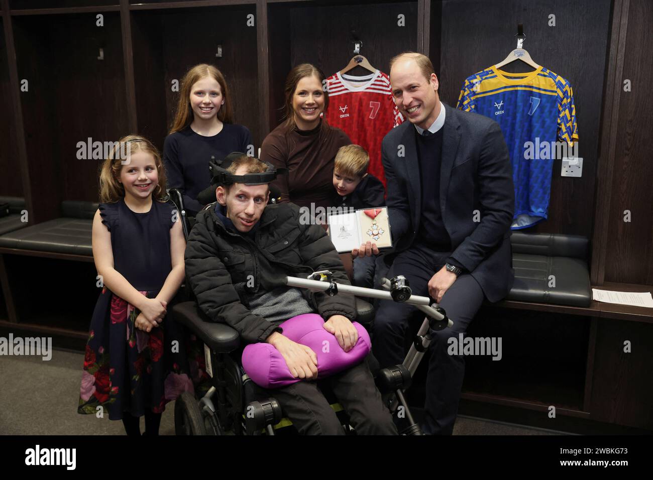 The Prince of Wales (right) meets Rob Burrow, his wife Lindsey Burrow ...