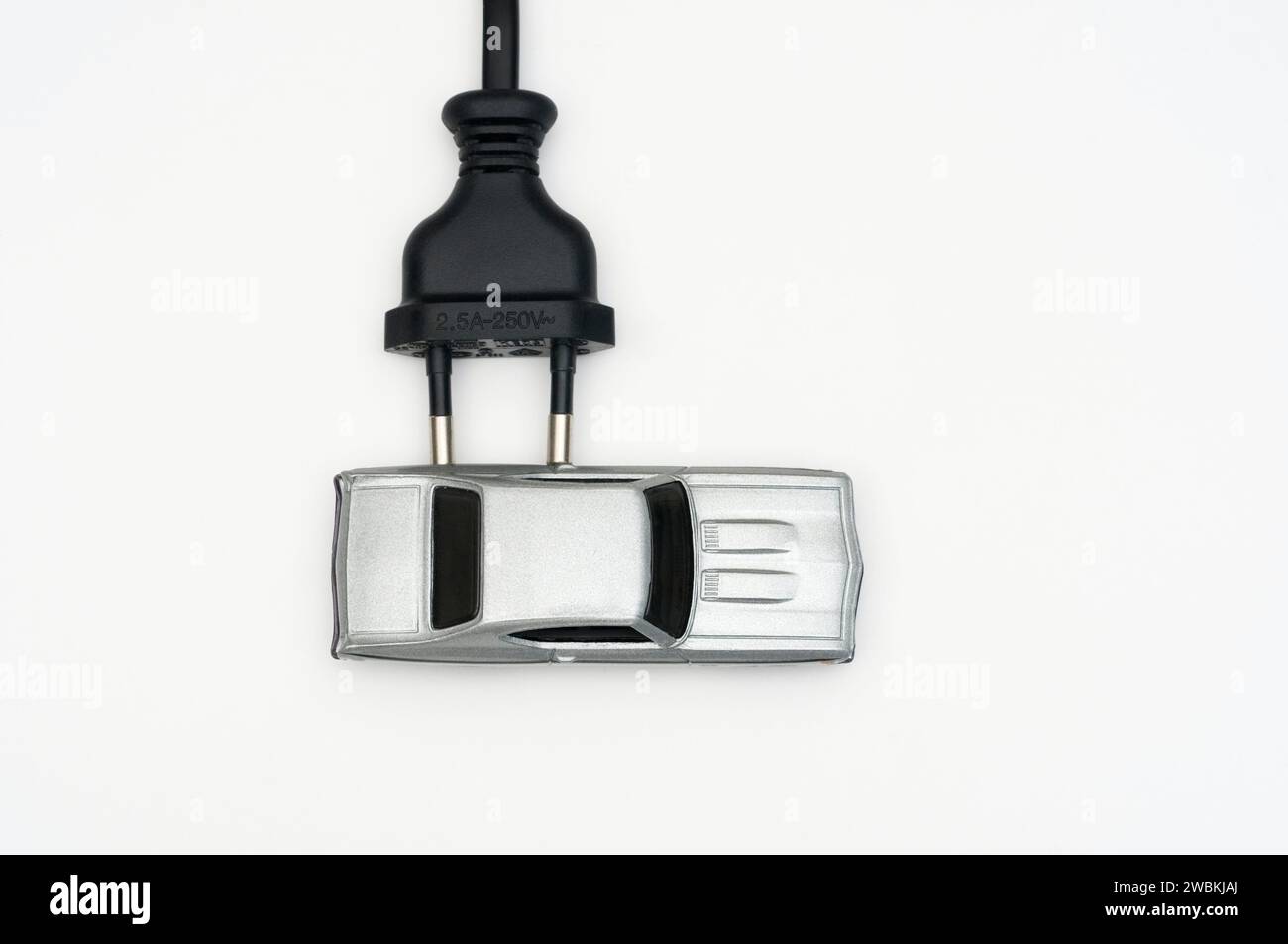 Miniature car with plug hi-res stock photography and images - Alamy