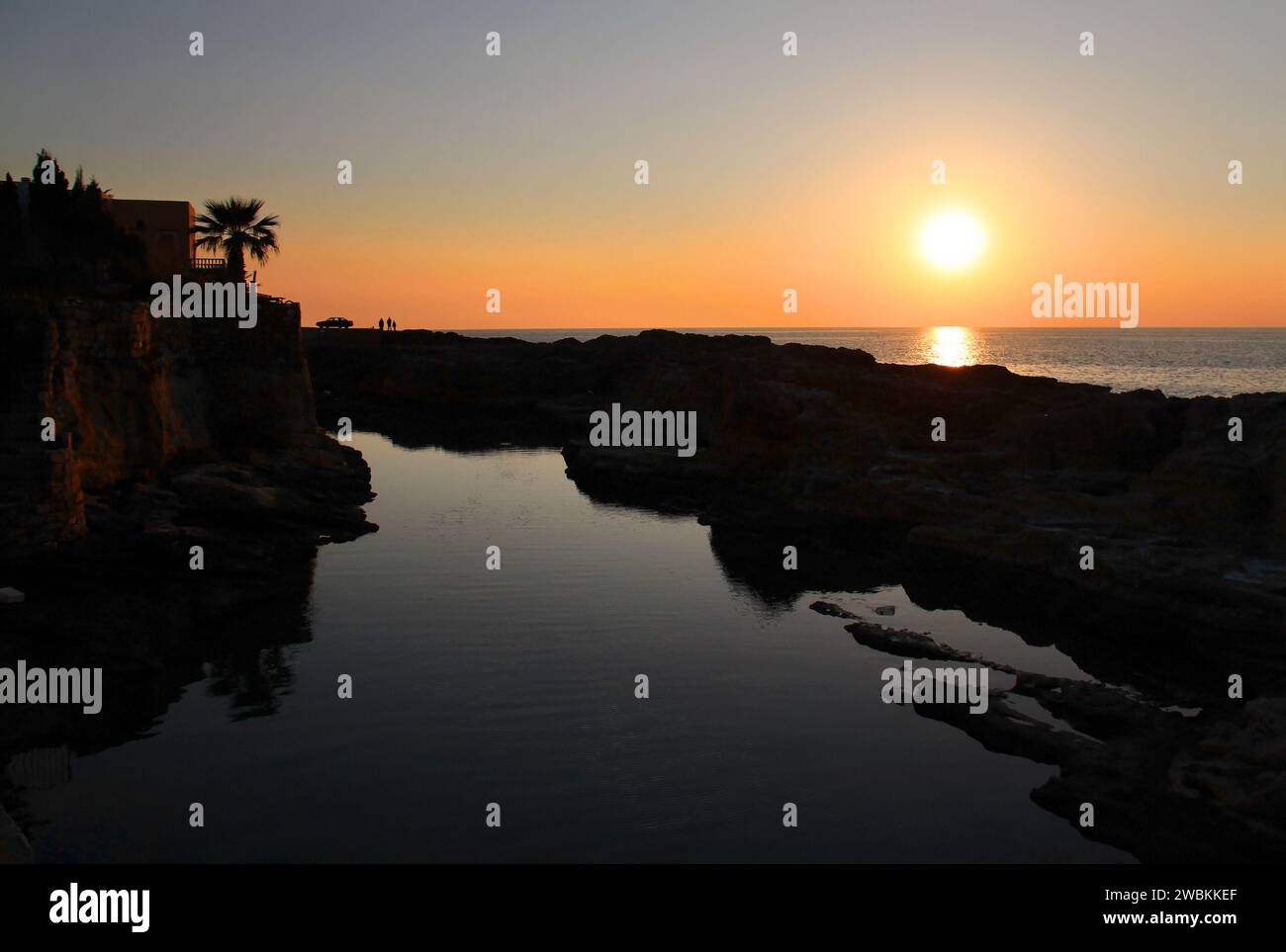 Scene of the sea harbor in Batroun at sunset, Lebanon Stock Photo - Alamy