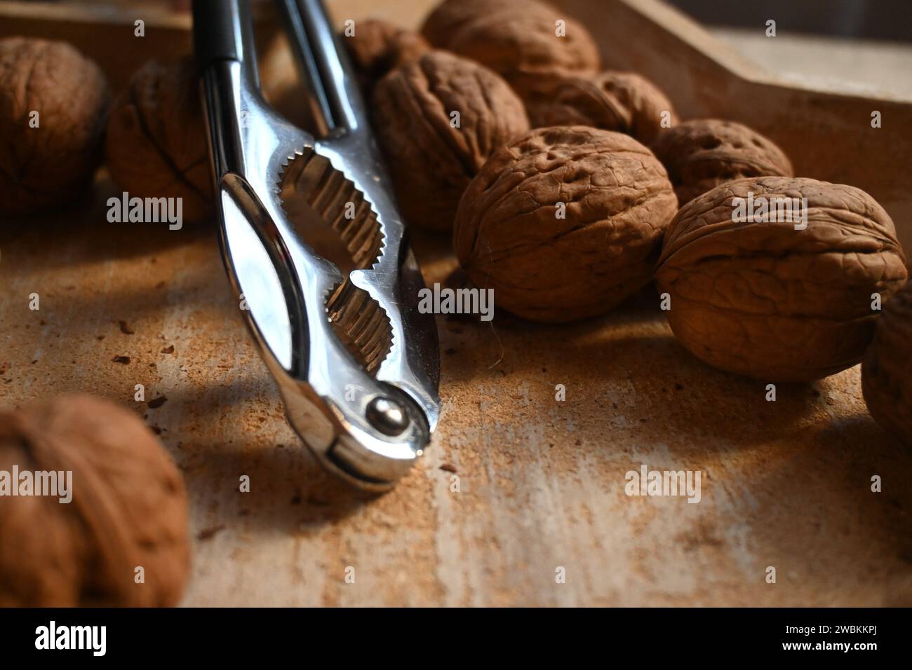 Walnut and nutcracker Stock Photo - Alamy