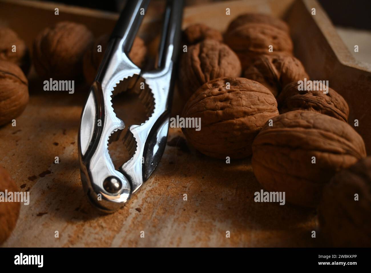 Walnut and nutcracker Stock Photo - Alamy