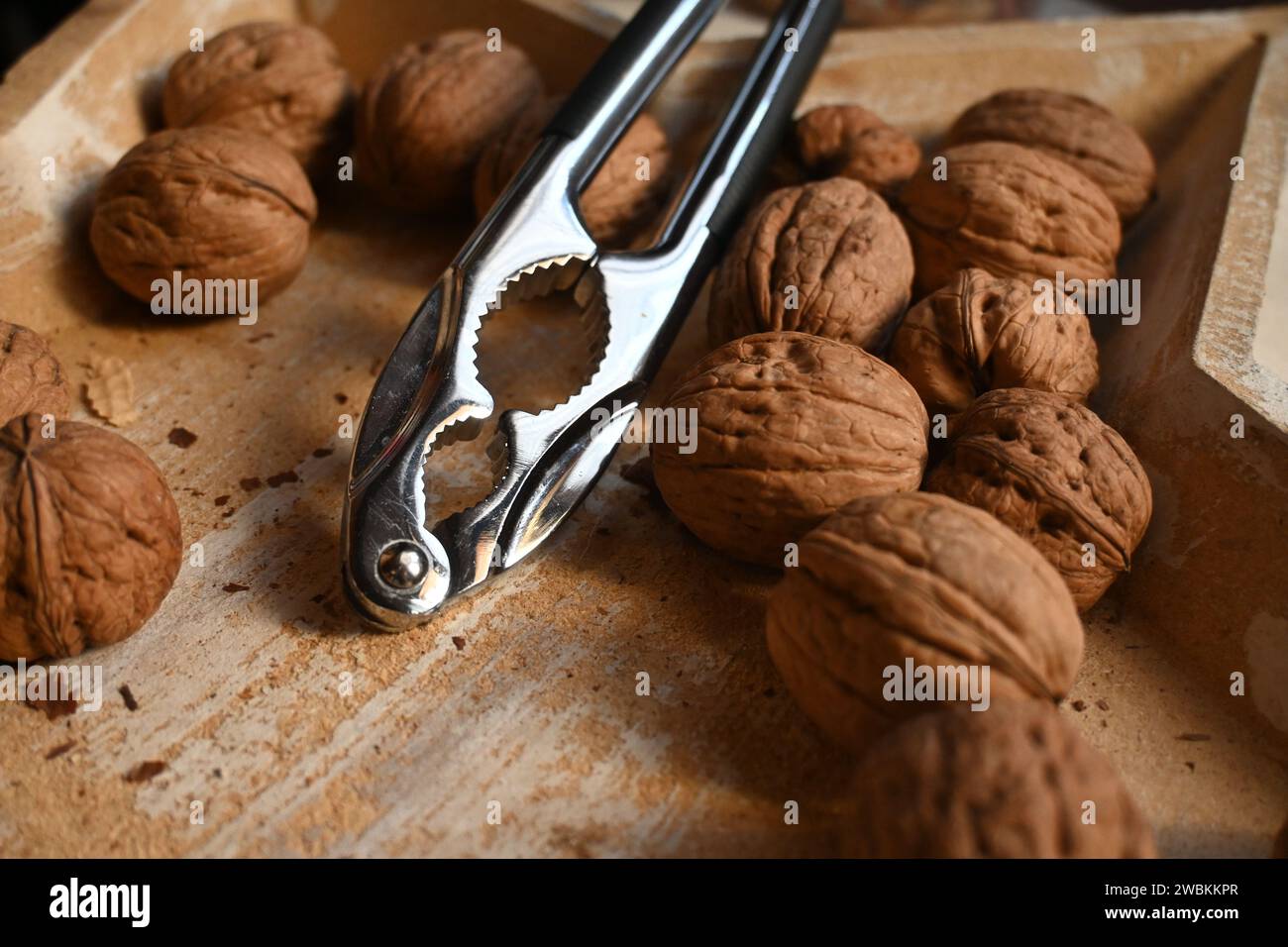 Walnut and nutcracker Stock Photo - Alamy