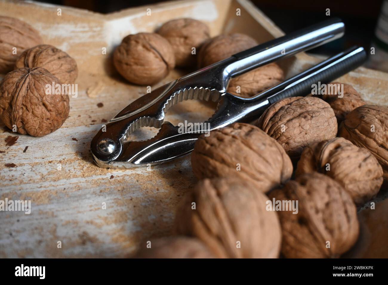 Walnut and nutcracker Stock Photo - Alamy