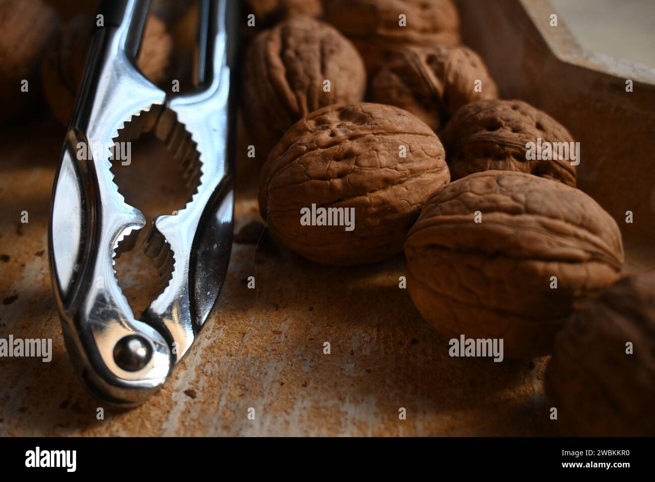Walnut and nutcracker Stock Photo - Alamy