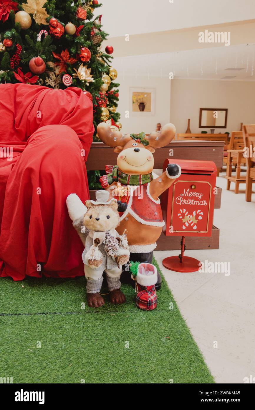 Christmas decoration with cute animal statues Stock Photo - Alamy