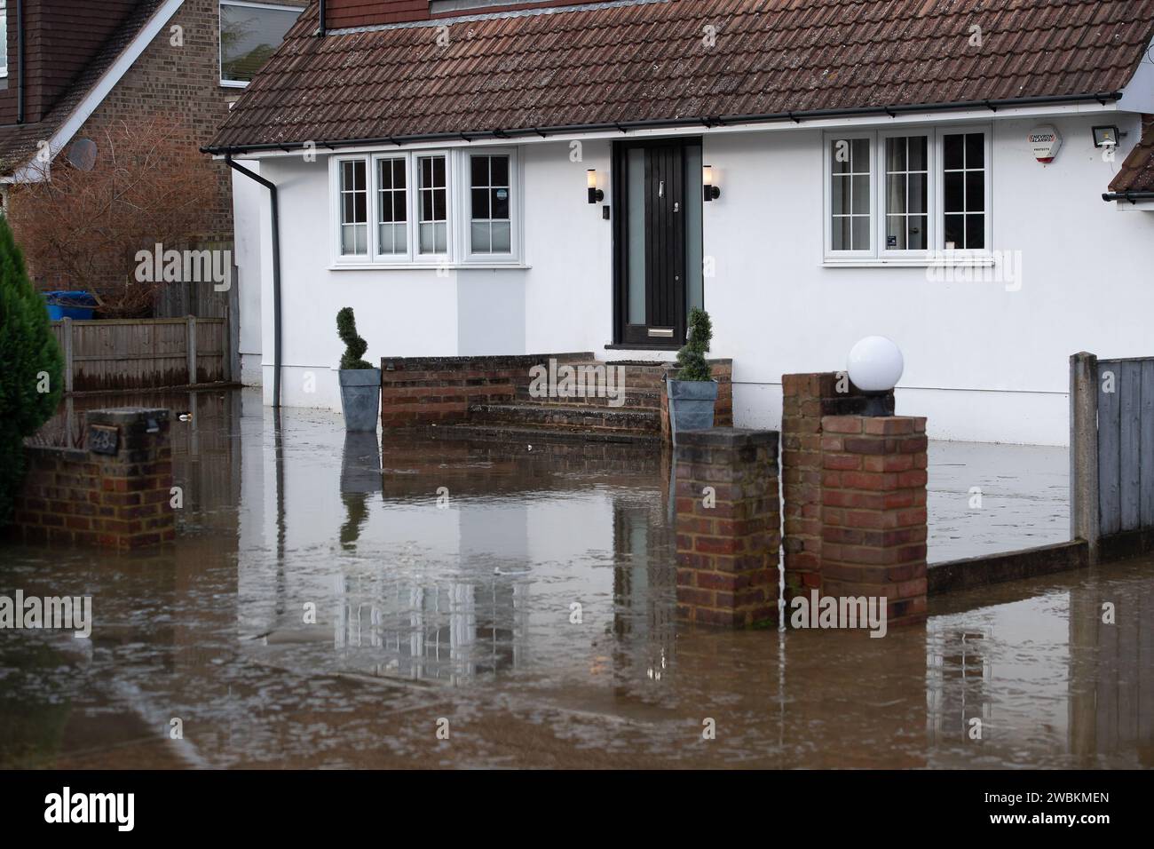 Wraysbury, UK. 11th January, 2024. Some gardens remain flooded in ...