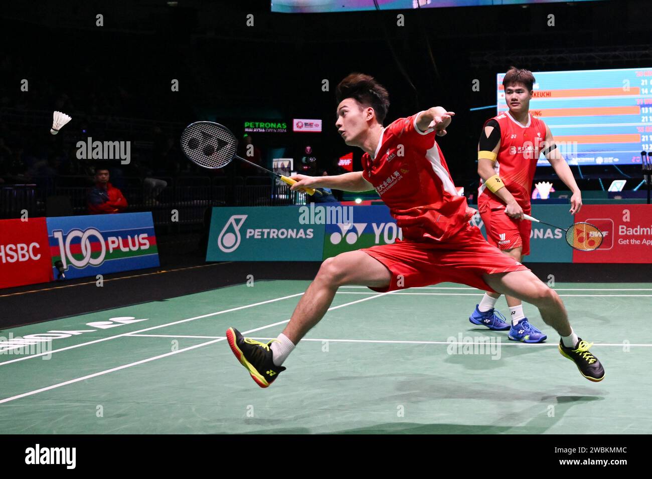 Kuala Lumpur, Malaysia. 11th Jan, 2024. Liang Weikeng(R)/Wang Chang of China compete during the ...