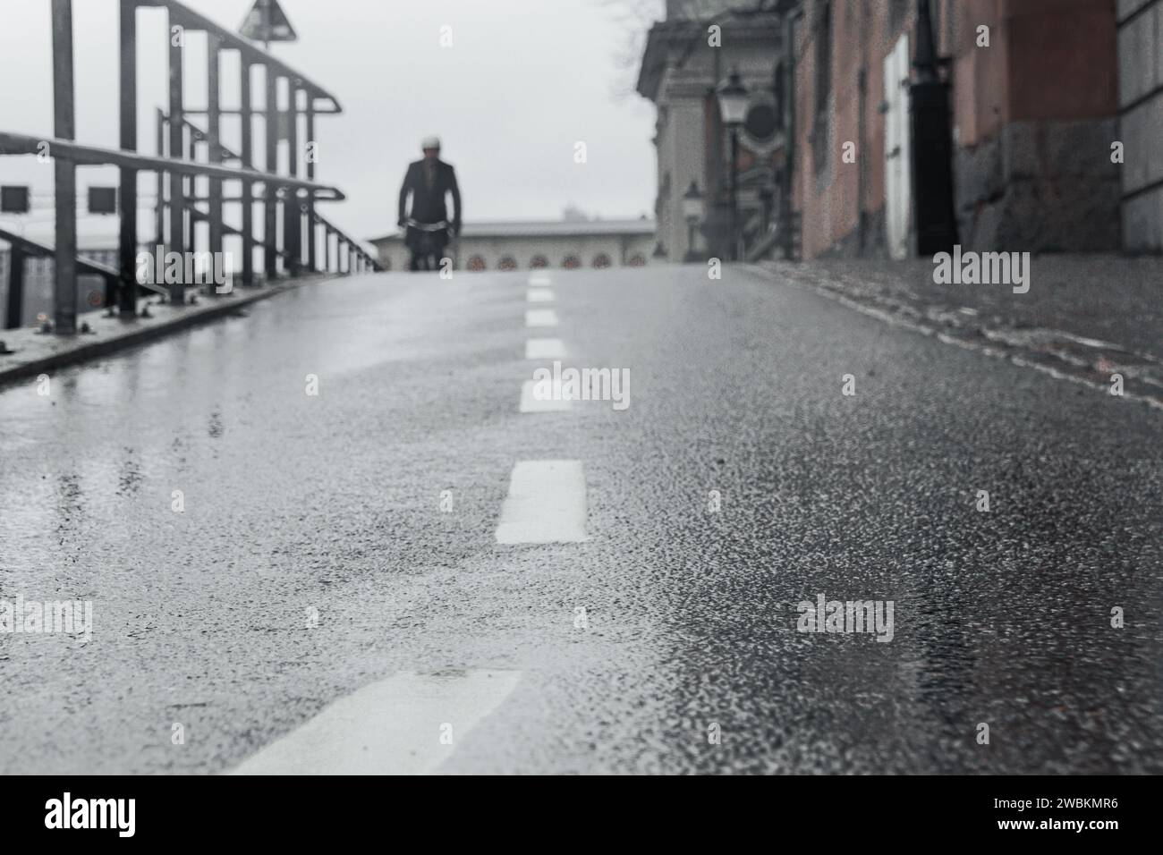 Wet road cycle path hi-res stock photography and images - Alamy
