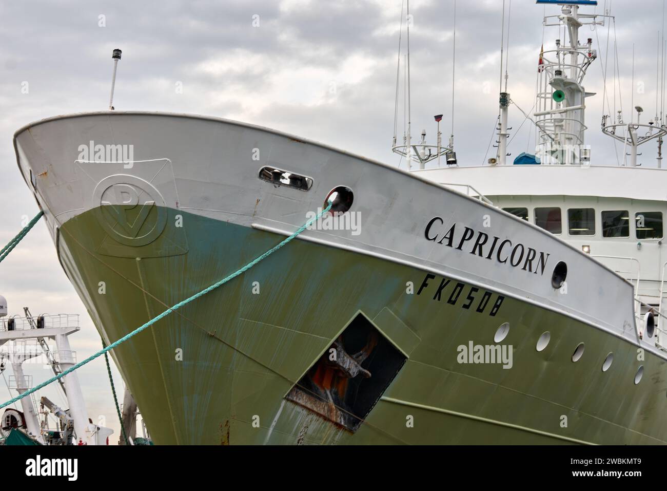 Deep-sea ships load provisions to go out to sea in the port of Vigo ...