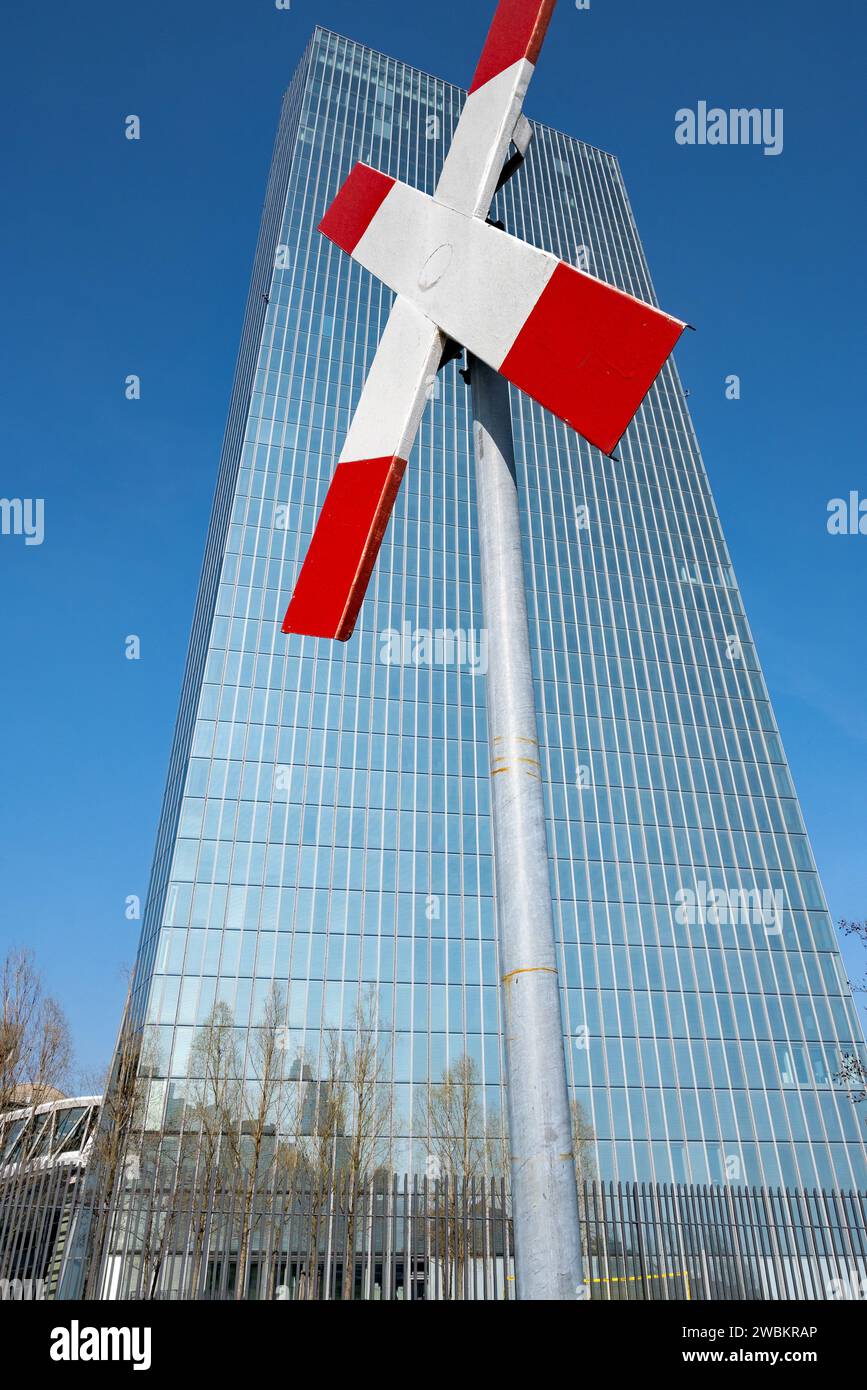 Office building in business district with traffic sign Stock Photo - Alamy