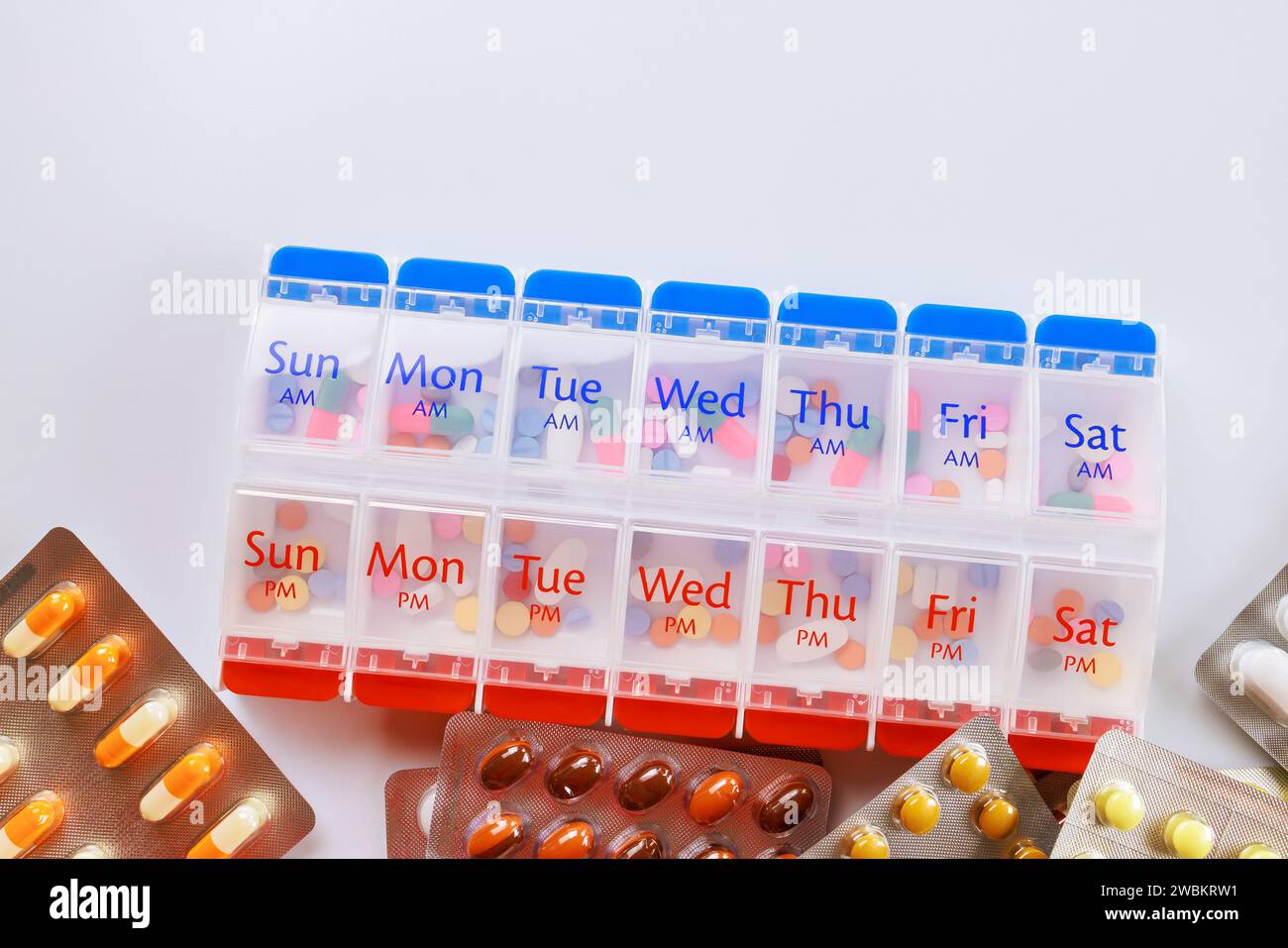 Drugs use for treatment is weekly organizer dispenser take of pills ...
