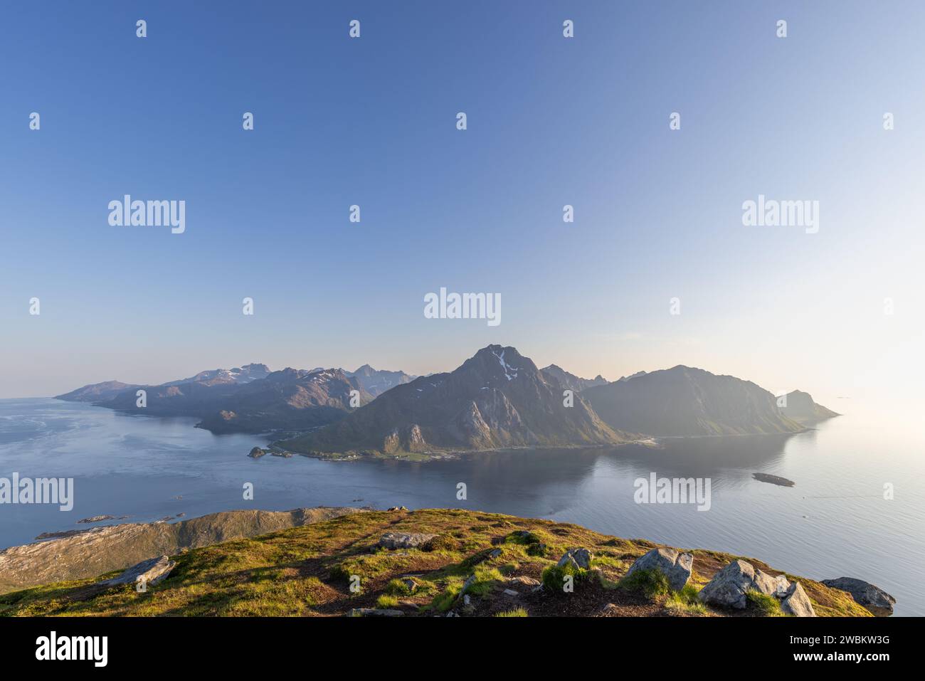 Gentle hues of the midnight sun illuminate the Lofoten Islands, as seen ...