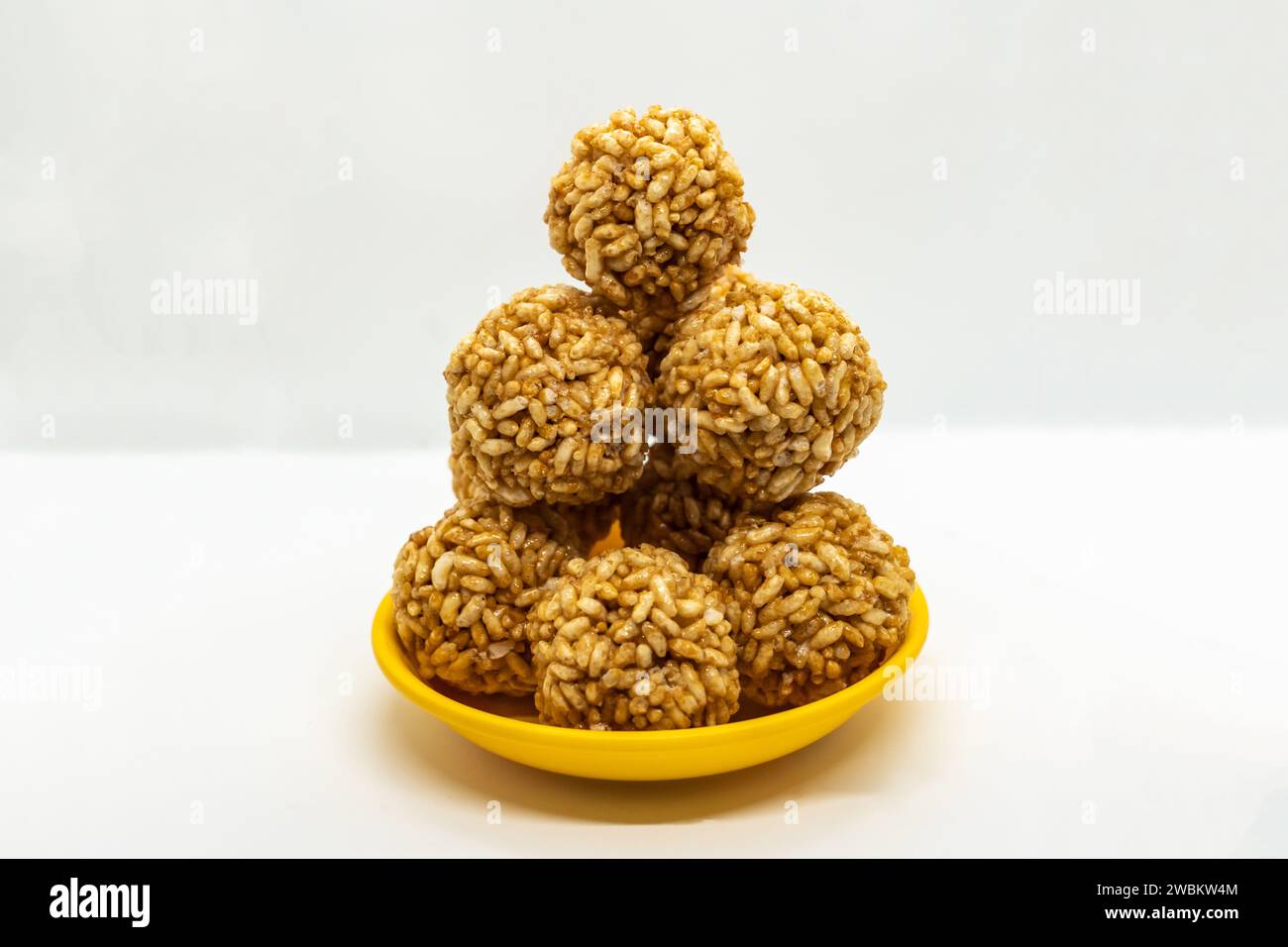 A plate of Murmura Murai Bhuja Ladoo Puffed Rice in Jaggery Balls for ...