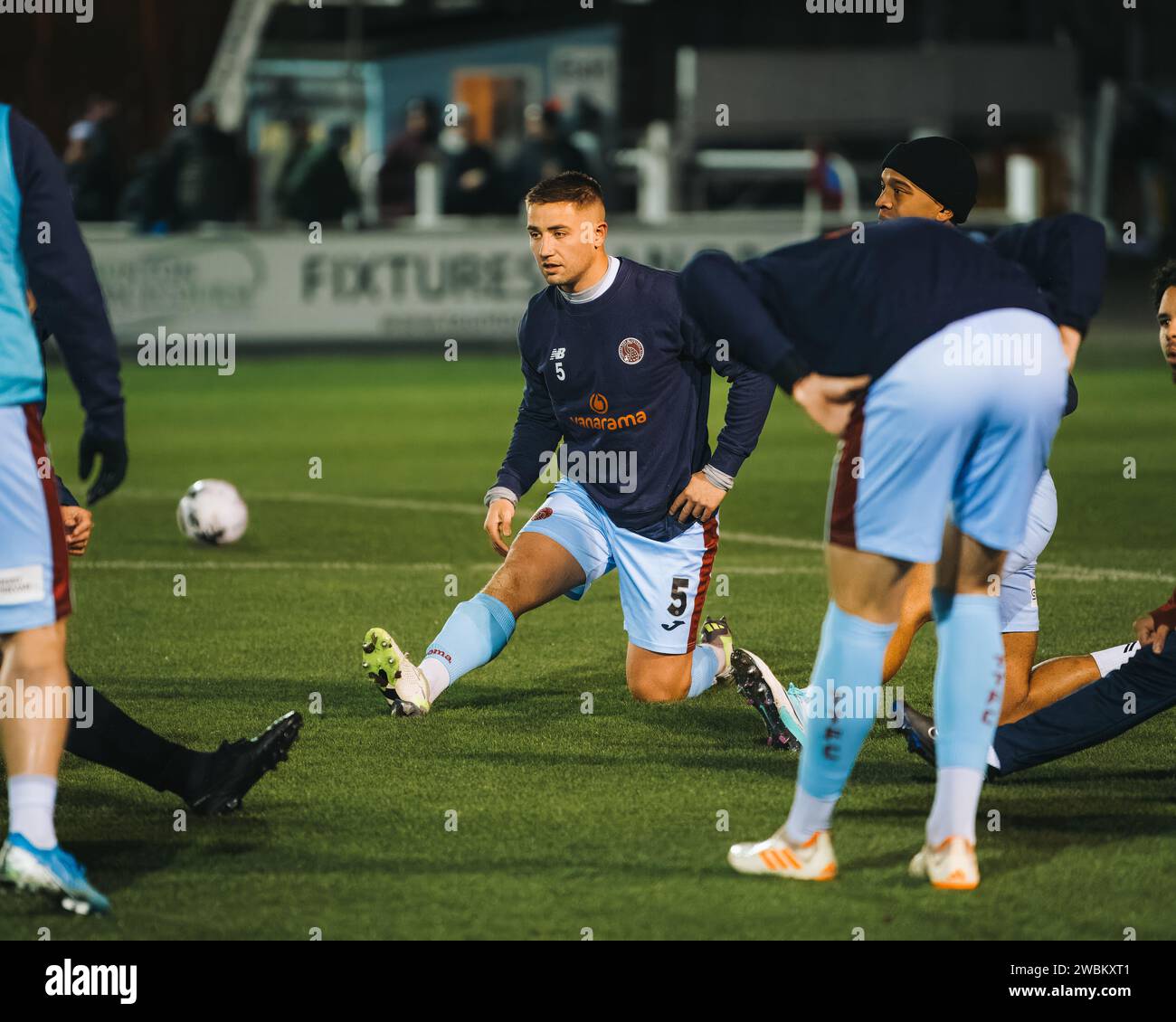 dan ball and Nathaniel Jarvis warm up before the game Stock Photo - Alamy
